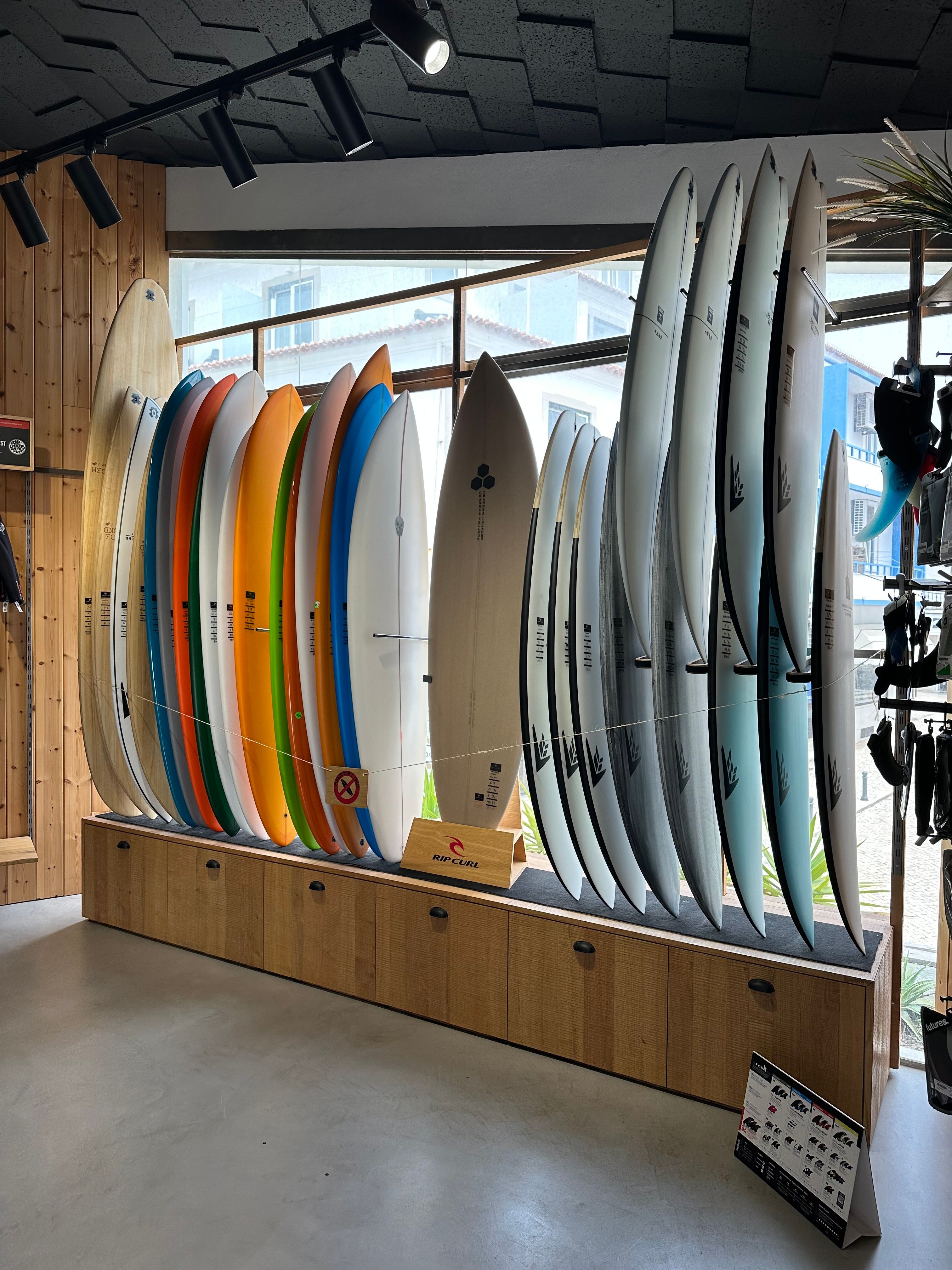 Colorful Surfboards Displayed in Surf Shop · Free Stock Photo