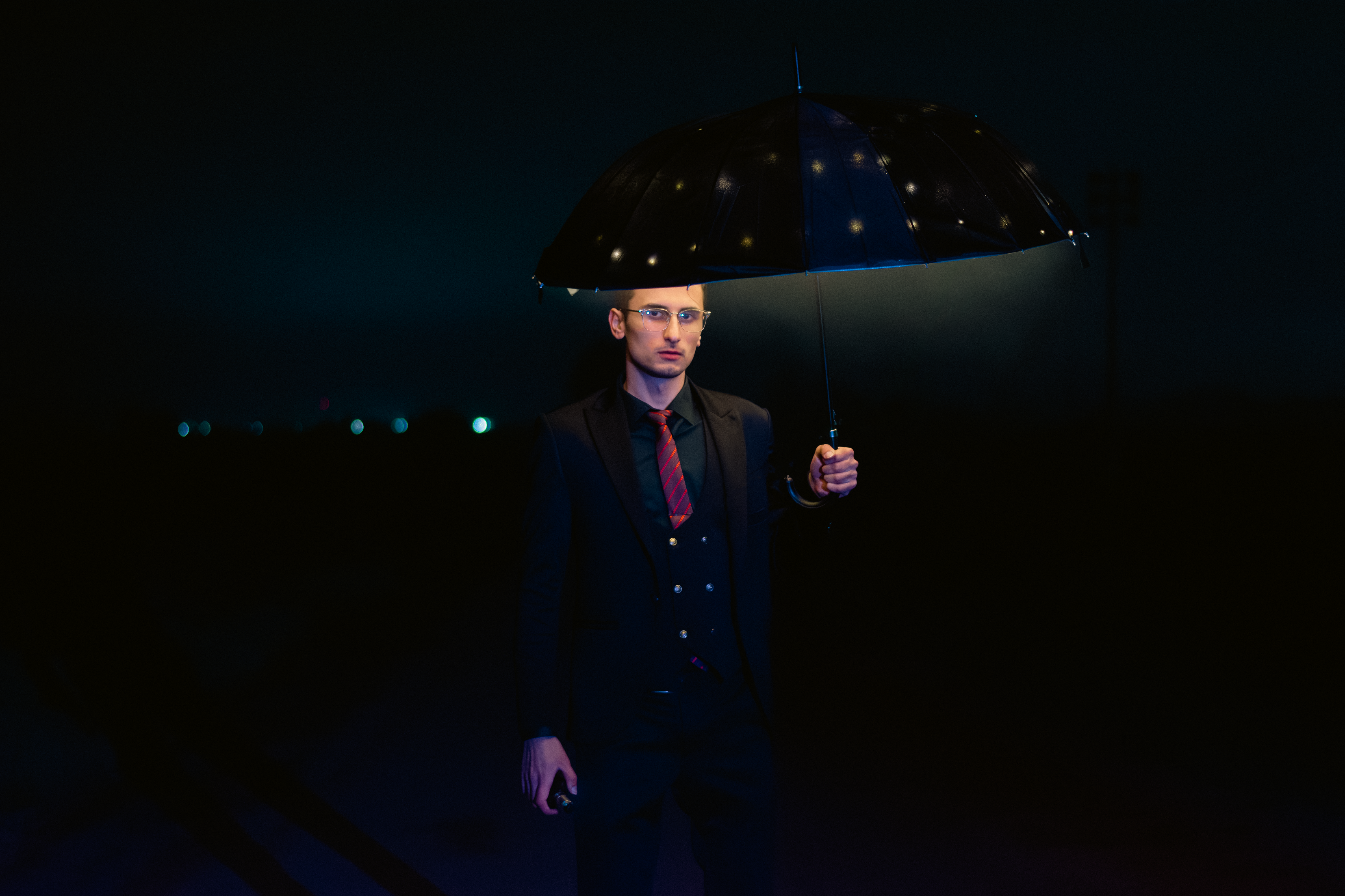 Elegant Nighttime Portrait with Illuminated Umbrella · Free Stock Photo