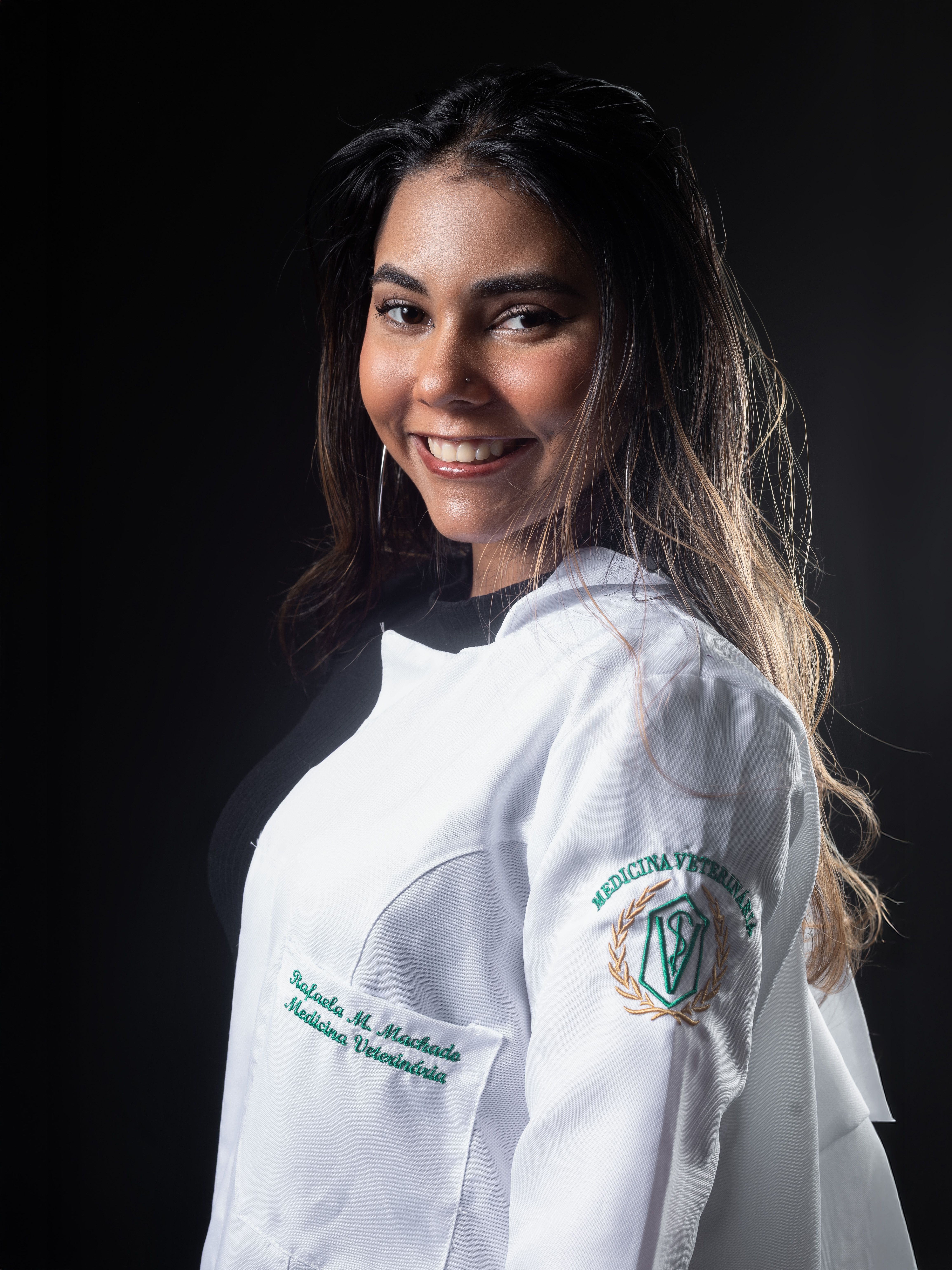 Young Veterinary Professional in White Coat · Free Stock Photo