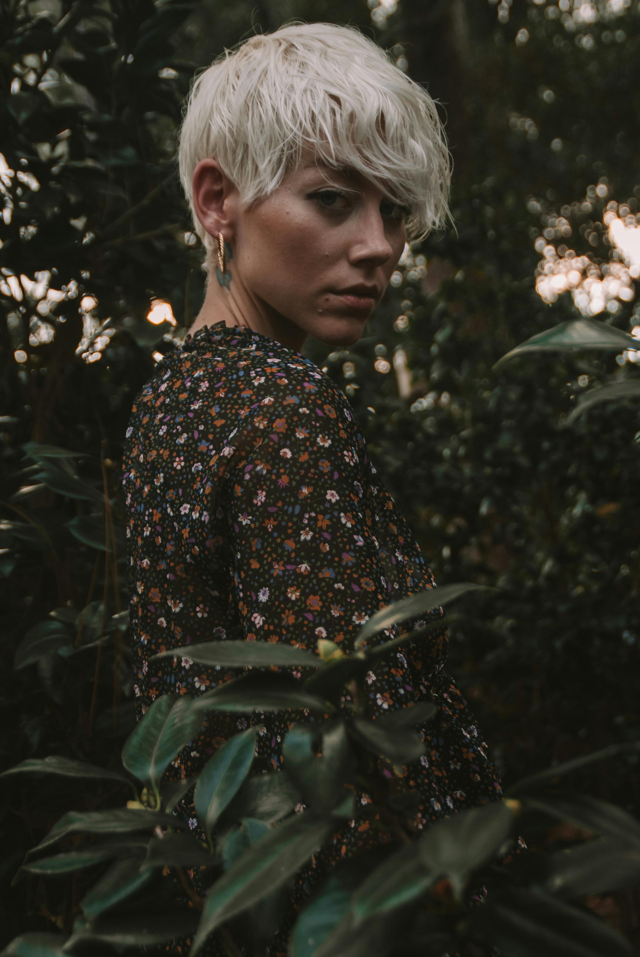 Portrait Photography of Woman Surrounded by Plants · Free Stock Photo