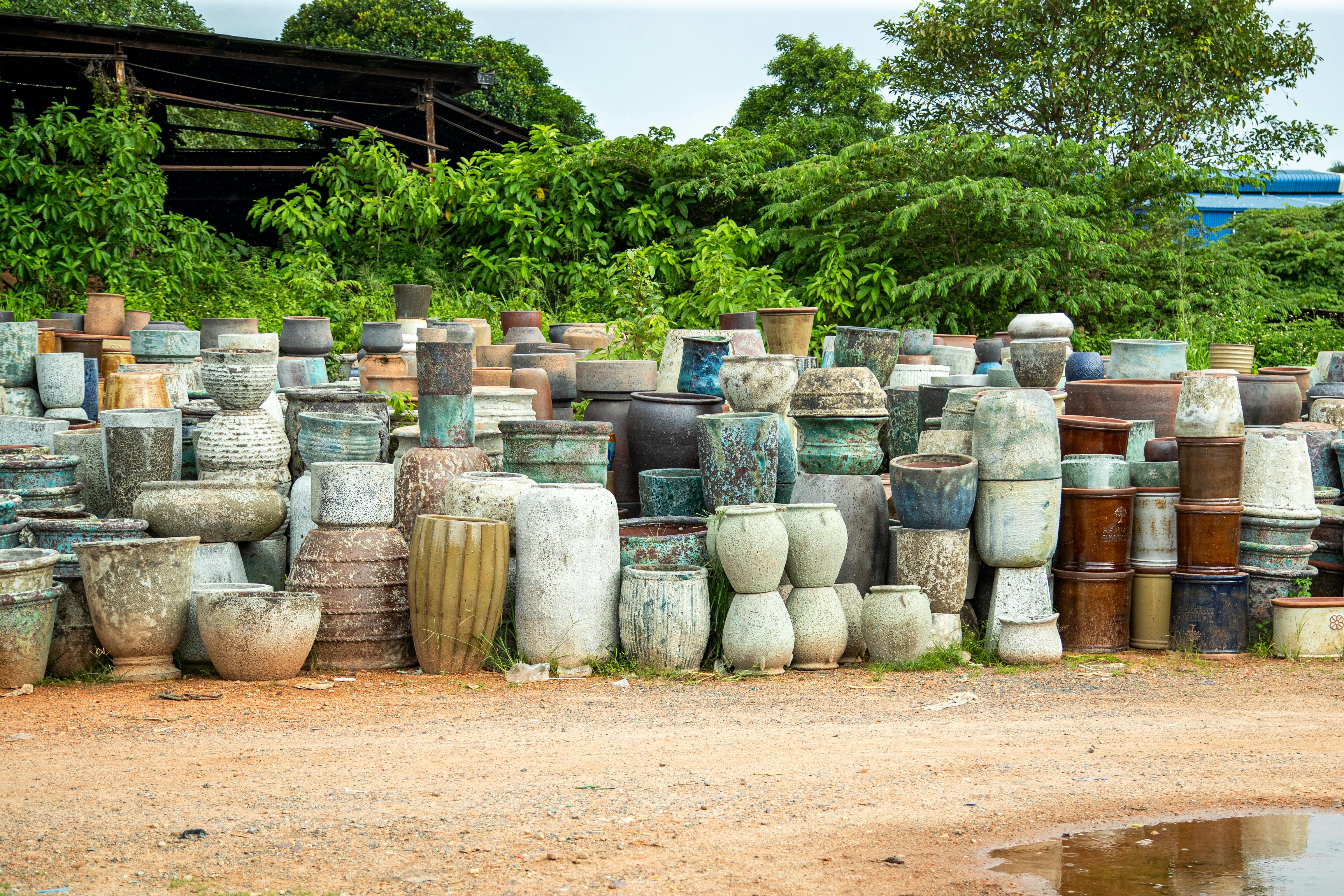 Assorted Ceramic Pots in Outdoor Marketplace · Free Stock Photo