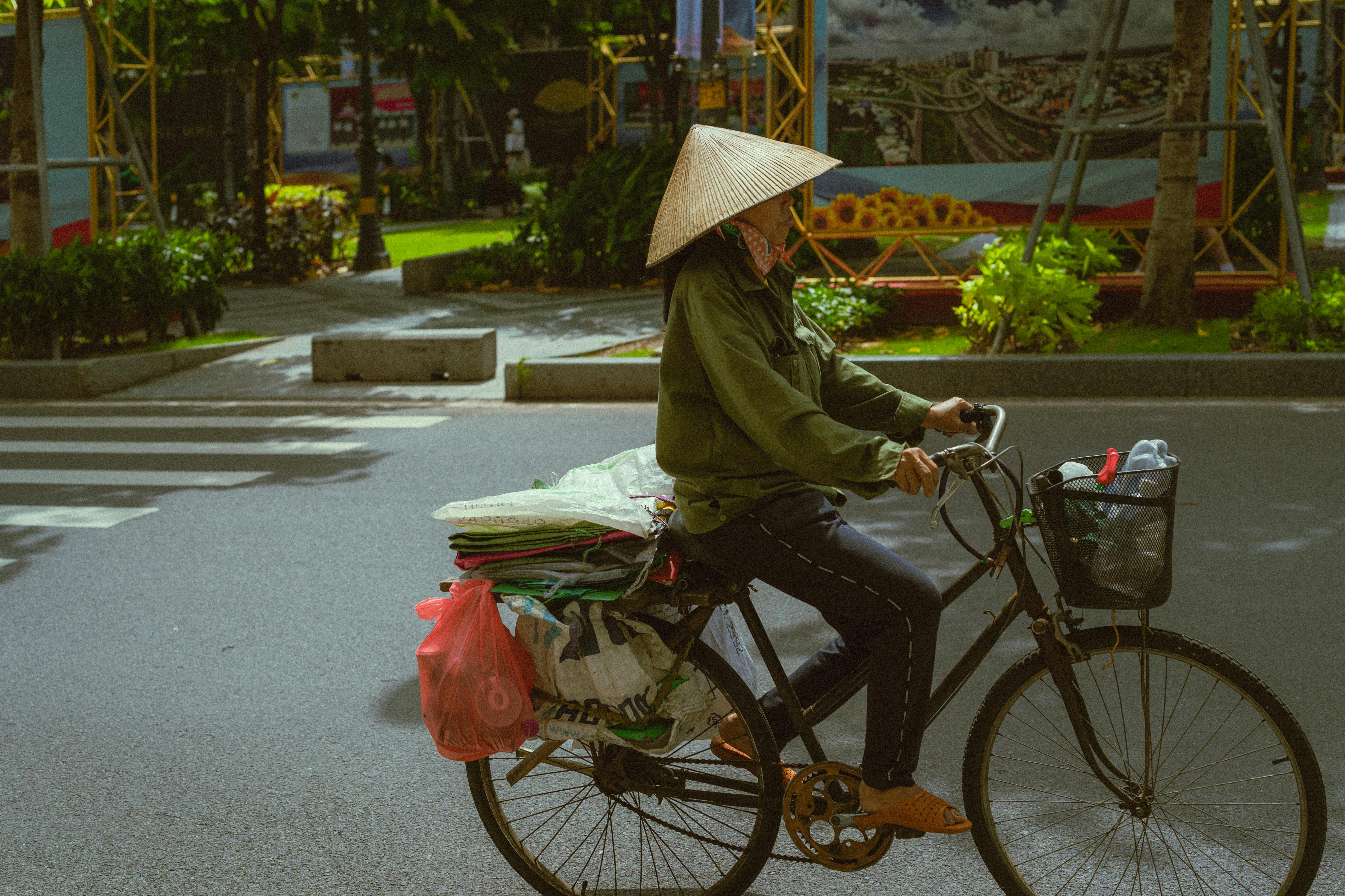 Street Scene in Ho Chi Minh City with Cyclist · Free Stock Photo