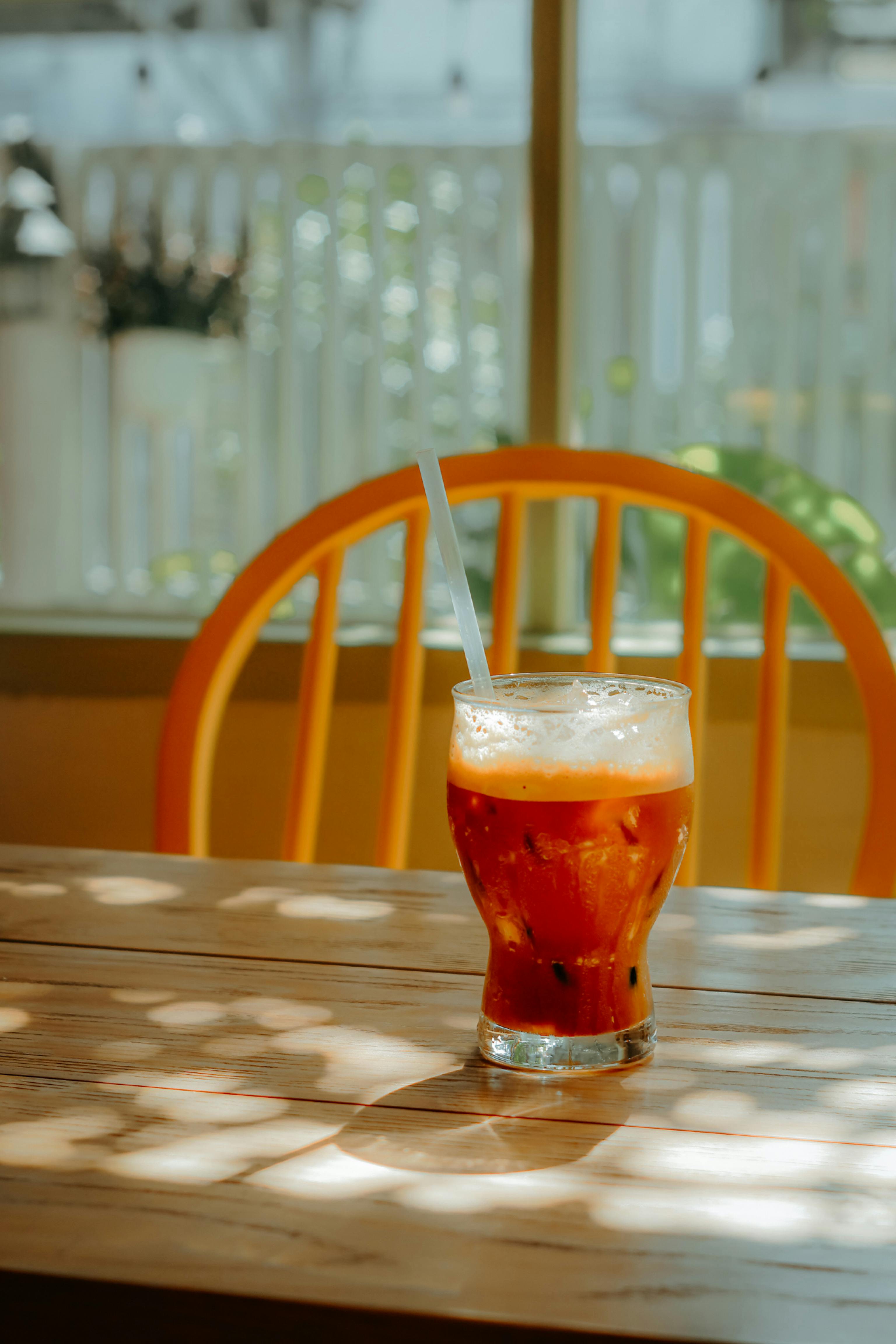 Iced Tea on Sunny Cafe Table · Free Stock Photo