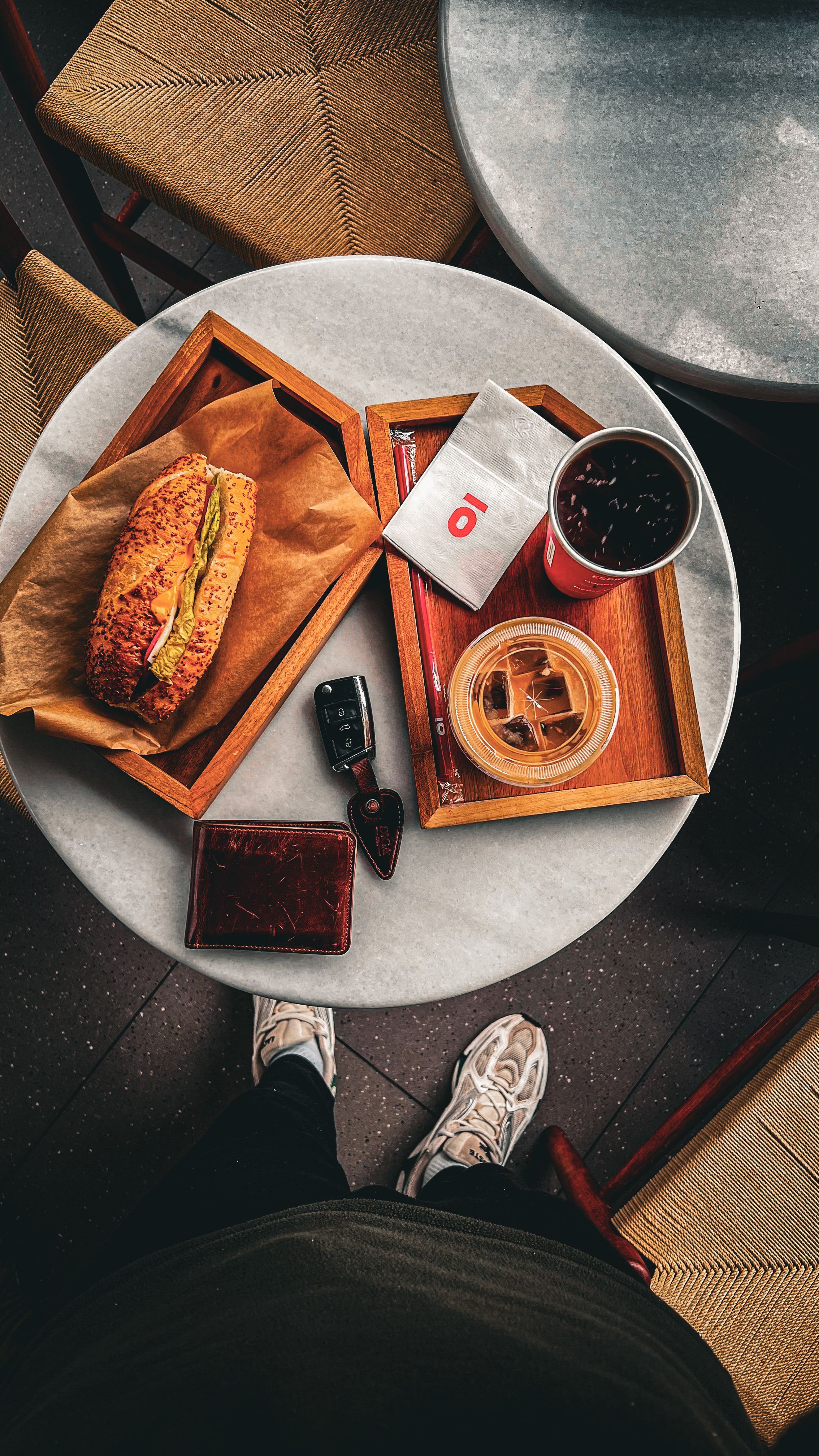 Flat Lay of Sandwich and Beverages on Cafe Table · Free Stock Photo