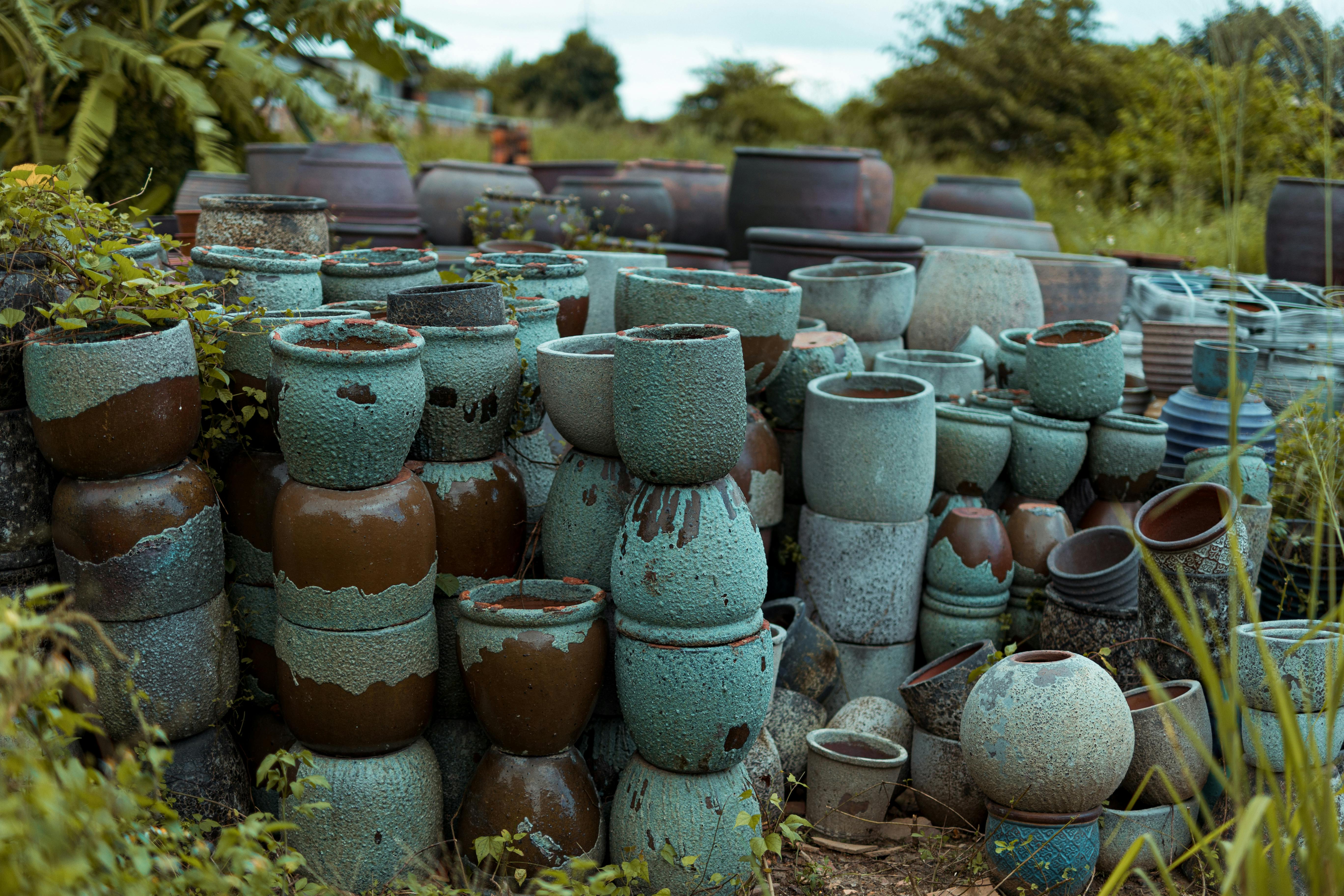 Rustic Ceramic Pots in a Vietnamese Garden Setting · Free Stock Photo