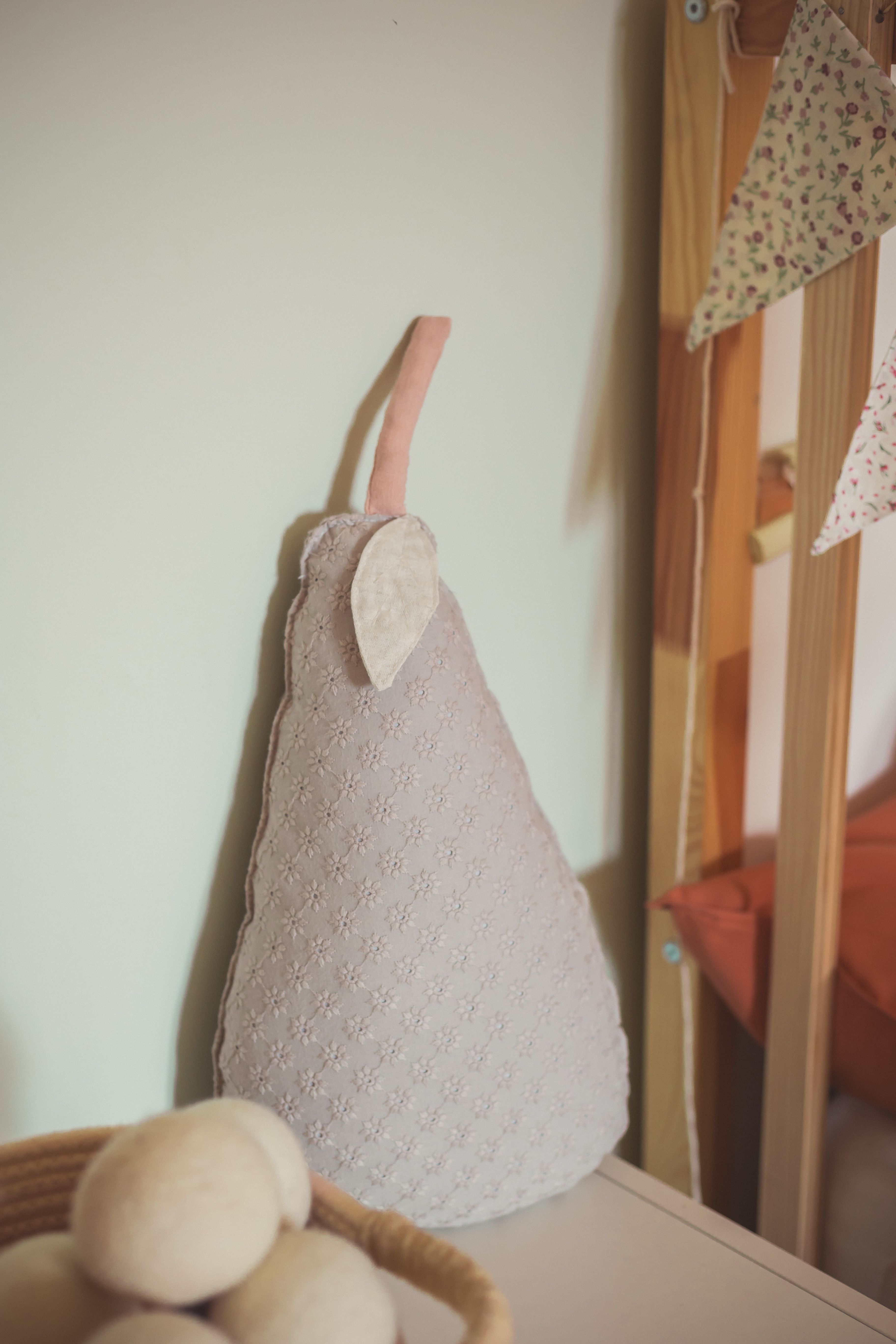 Soft Pear-Shaped Cushion in Cozy Nursery Room · Free Stock Photo