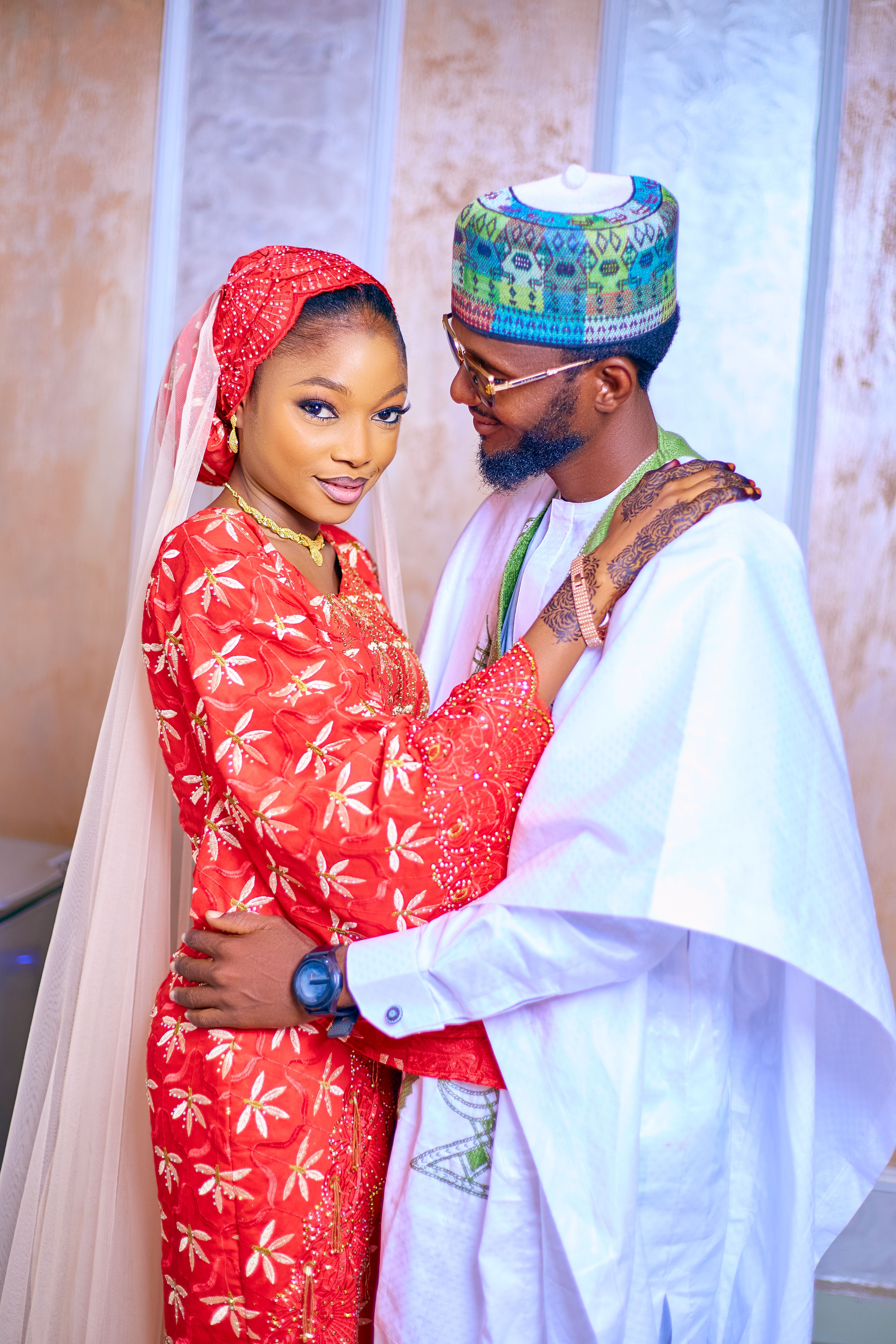 Traditional Wedding Couple in Vibrant Attire · Free Stock Photo
