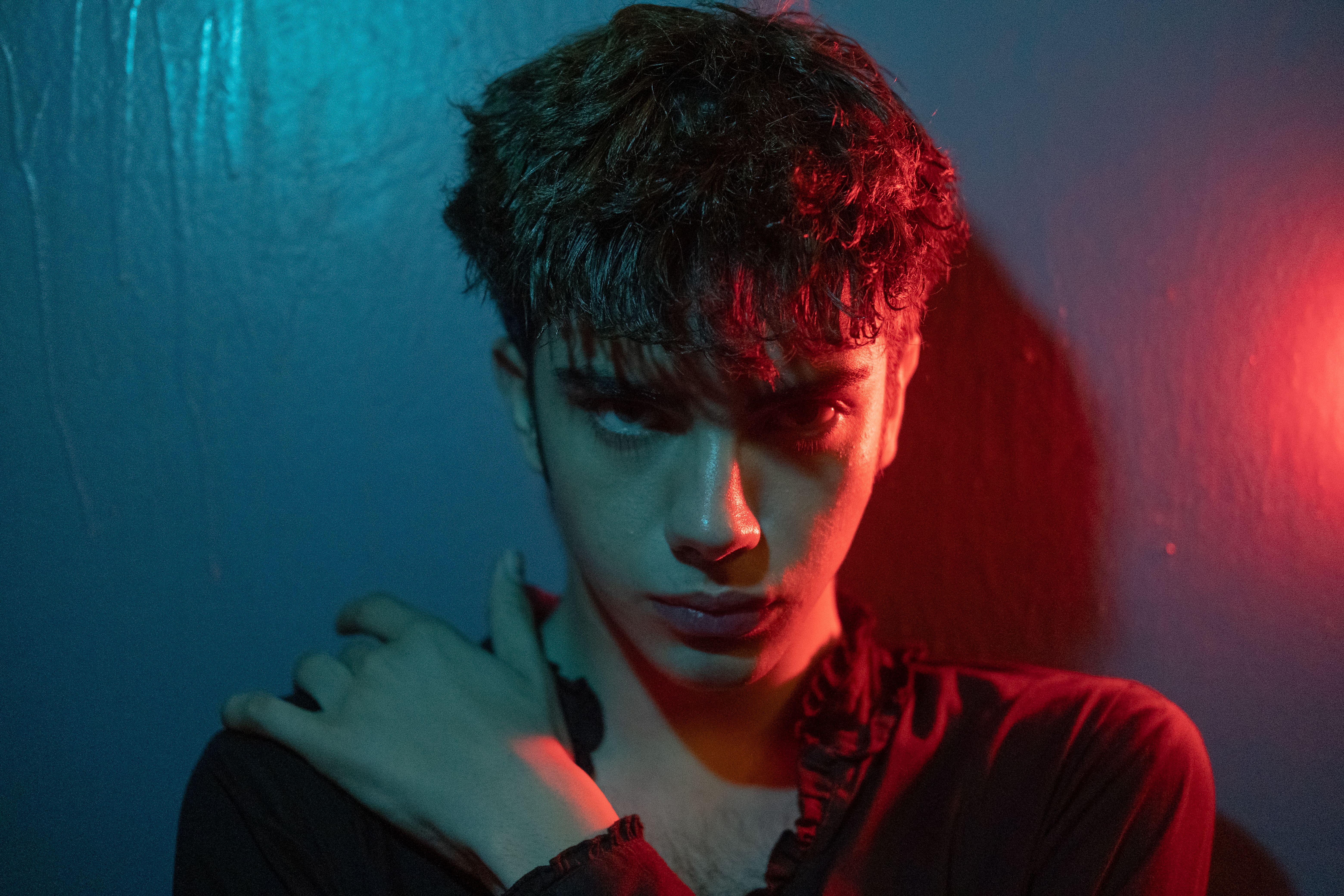 Moody Portrait of a Young Man in Dramatic Lighting · Free Stock Photo