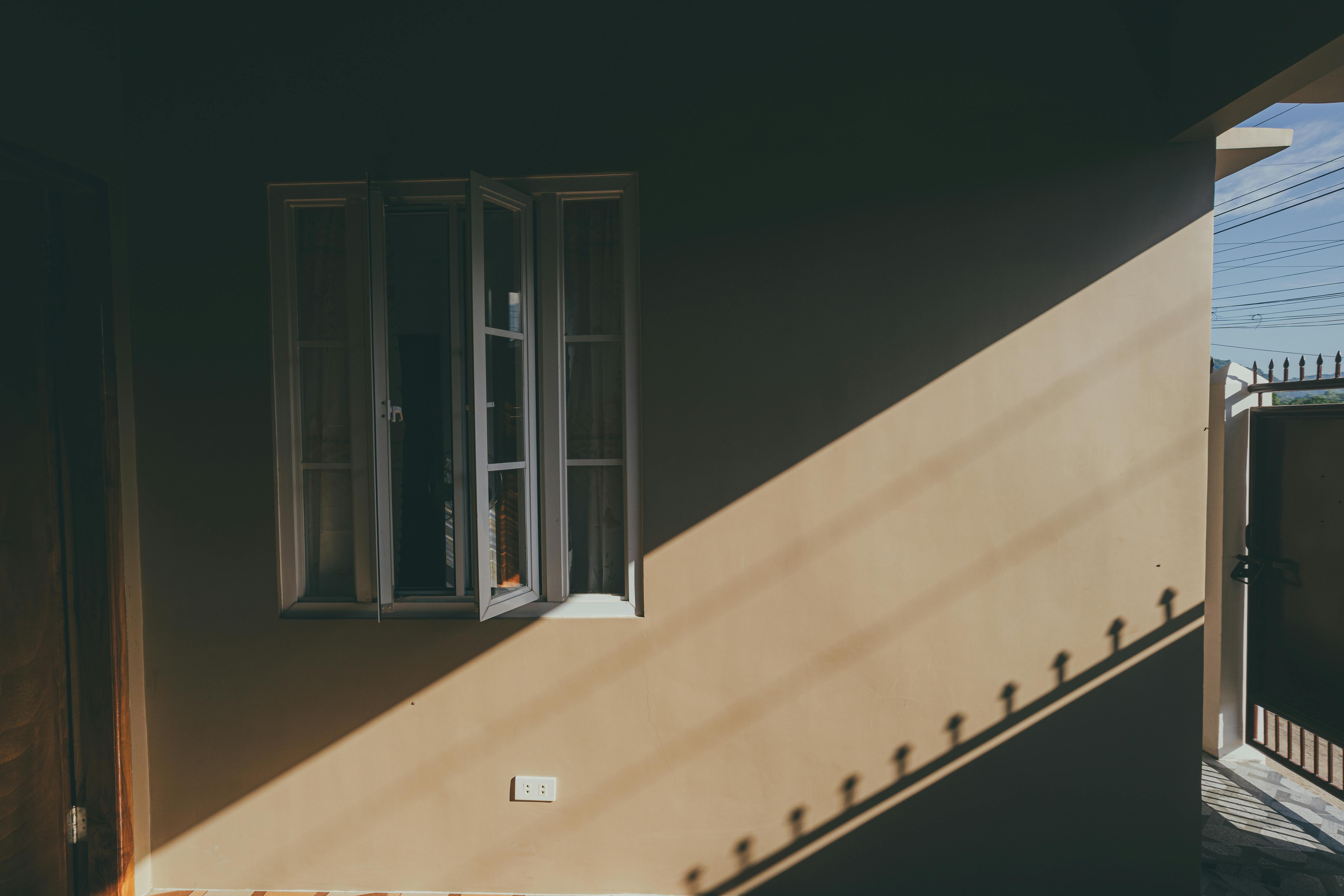 Warm Sunlight Casting Shadows Indoors · Free Stock Photo