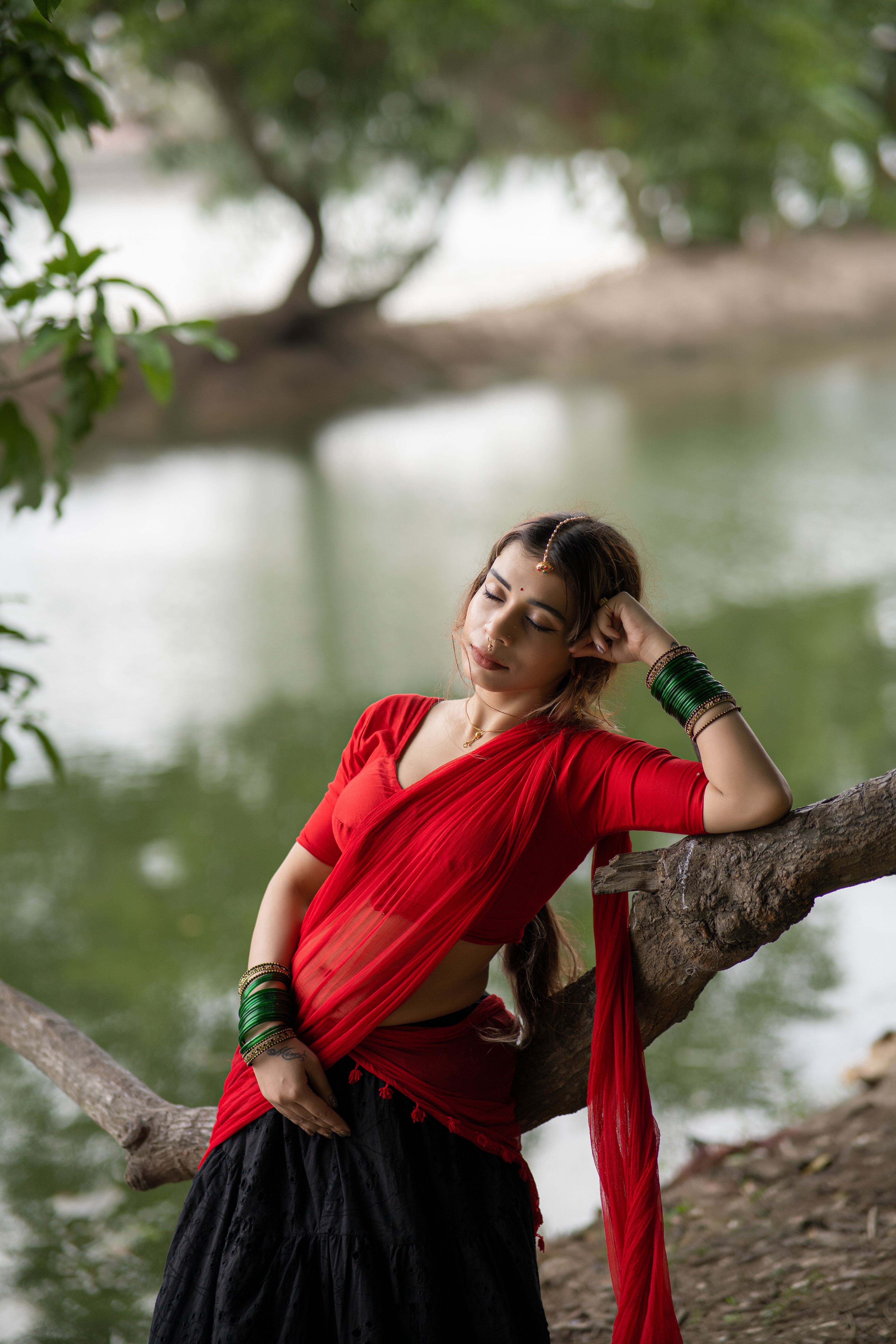Peaceful Woman in Red Sari by Tranquil Lake · Free Stock Photo