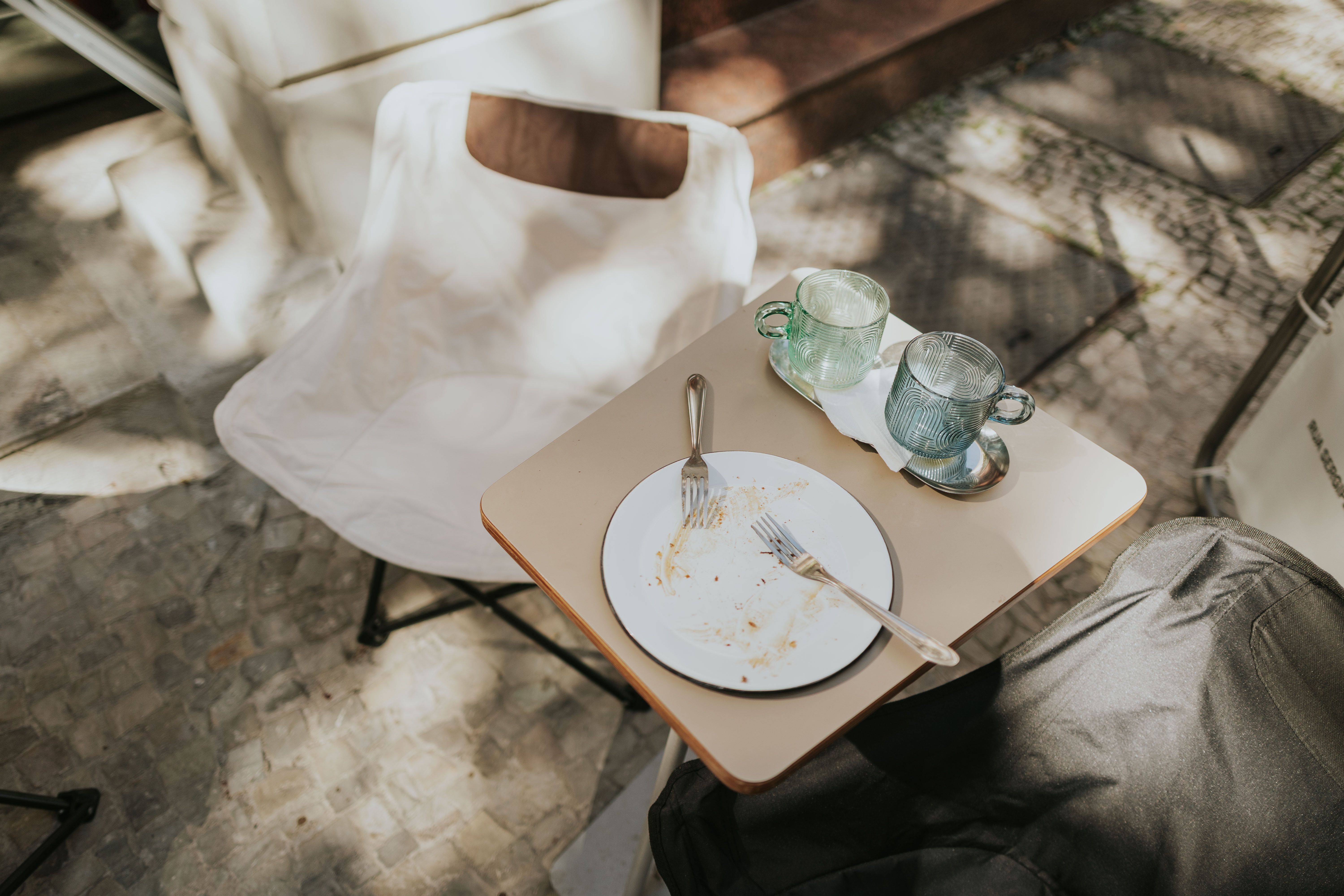 Charming Outdoor Café Setting with Finished Plate · Free Stock Photo