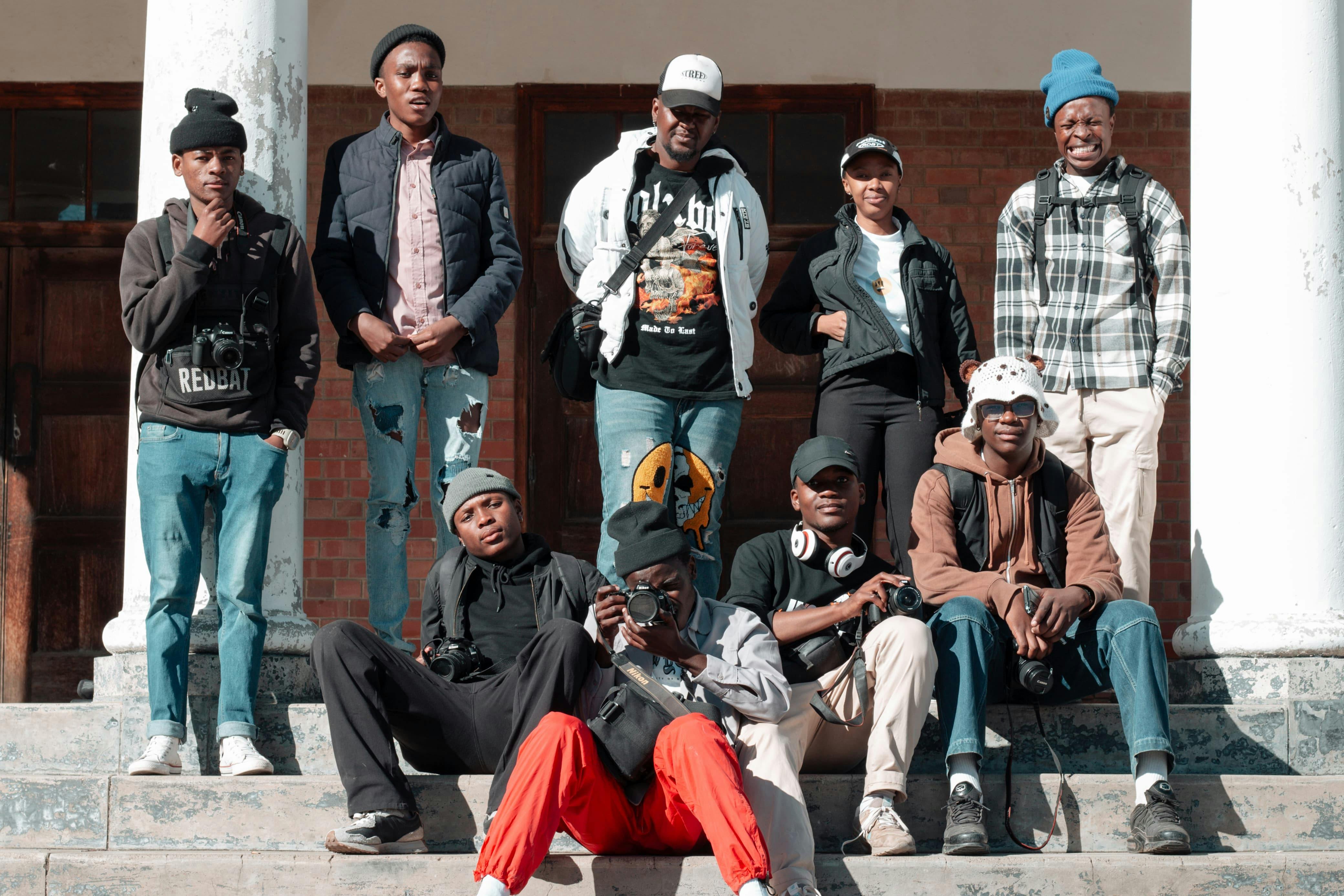 Group of Photographers on Urban Steps · Free Stock Photo