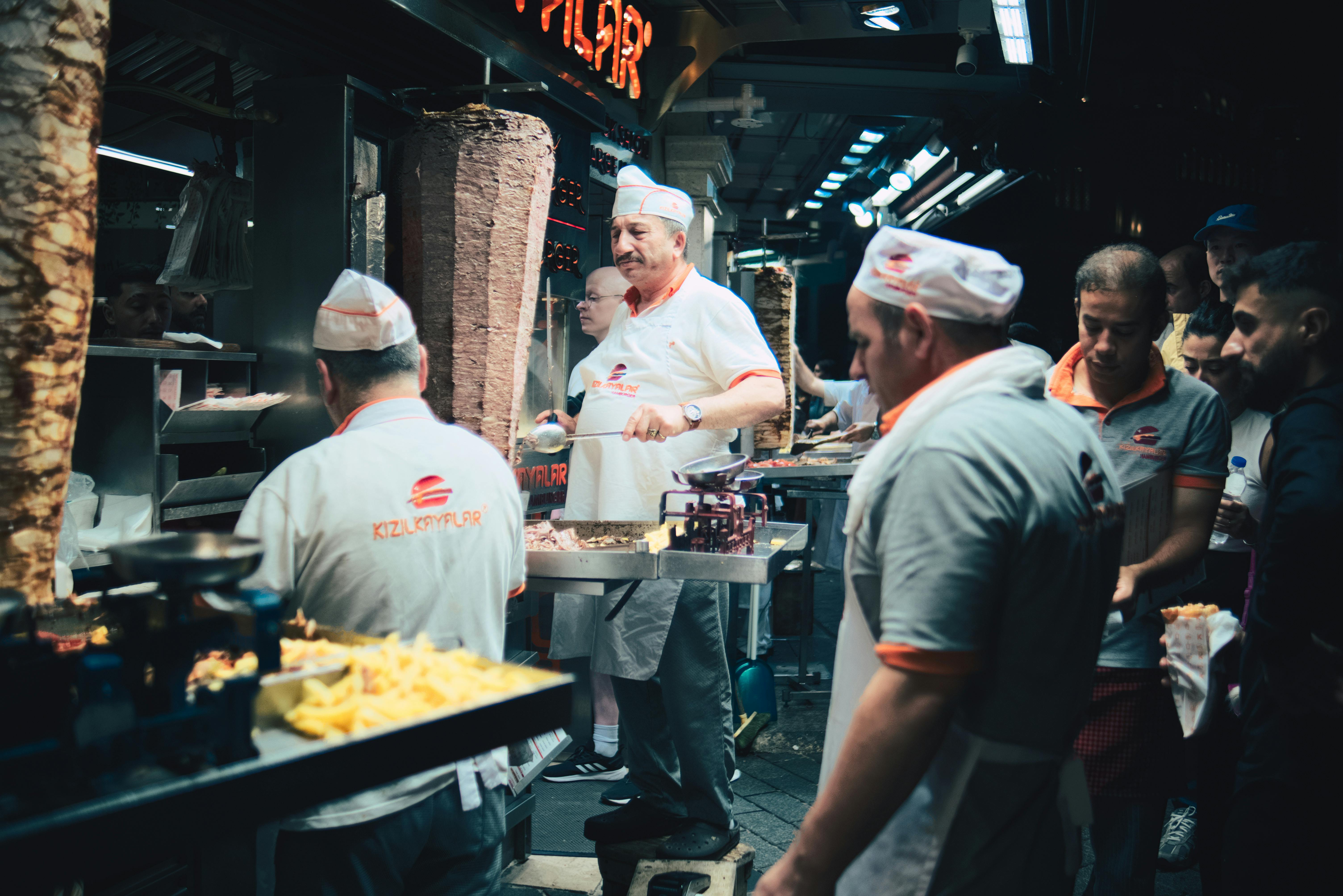 Night Street Food Scene with Doner Kebab in Istanbul · Free Stock Photo
