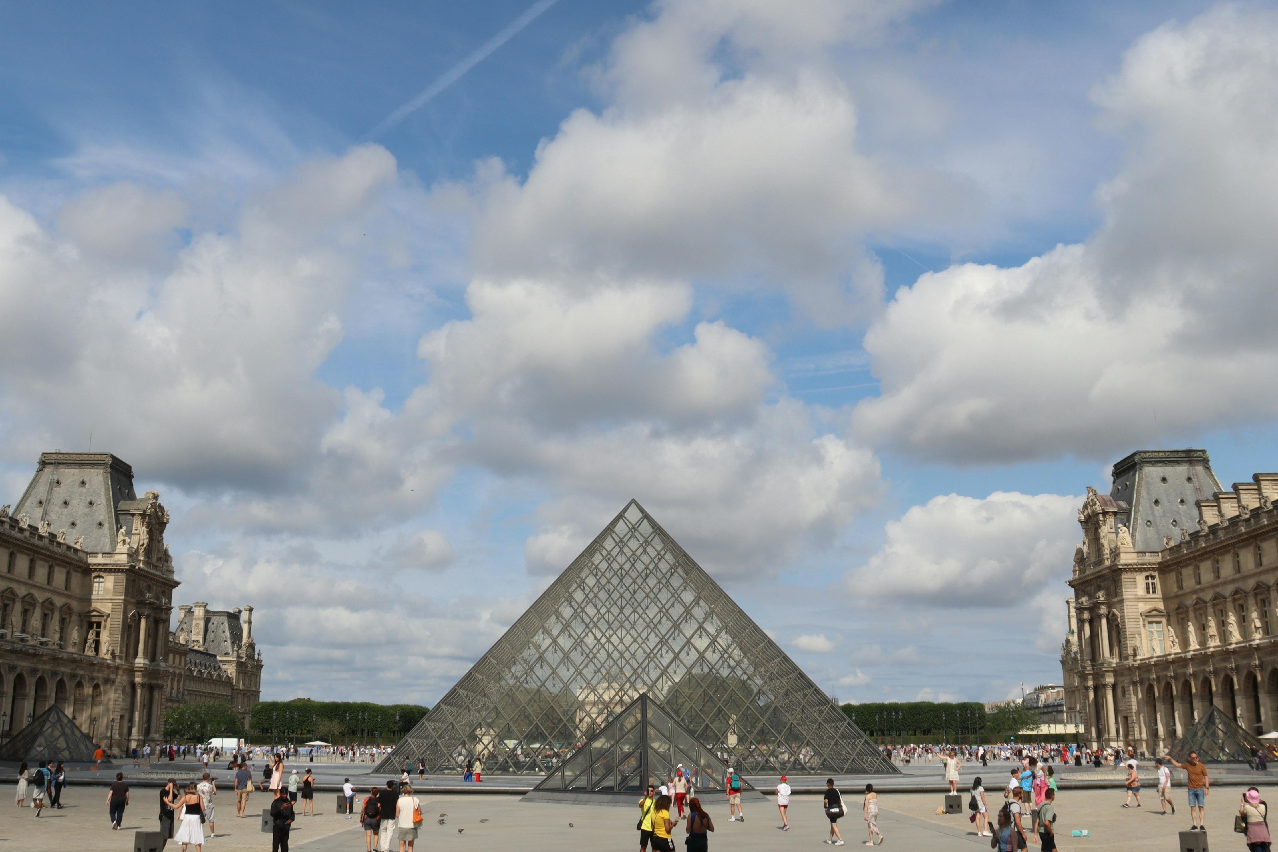 Iconic Louvre Pyramid in Paris France · Free Stock Photo