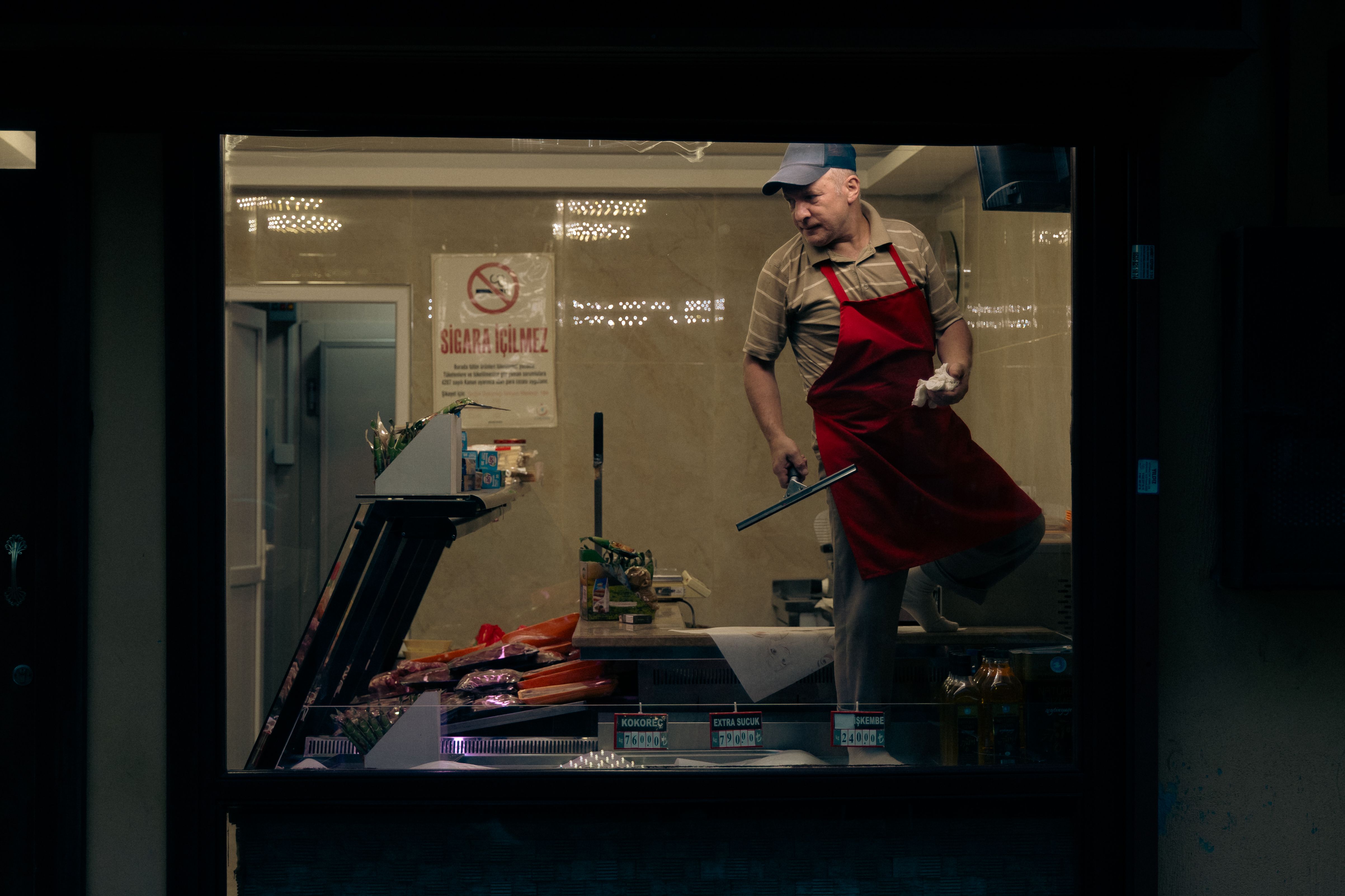 Butcher at Work in Traditional Turkish Shop · Free Stock Photo