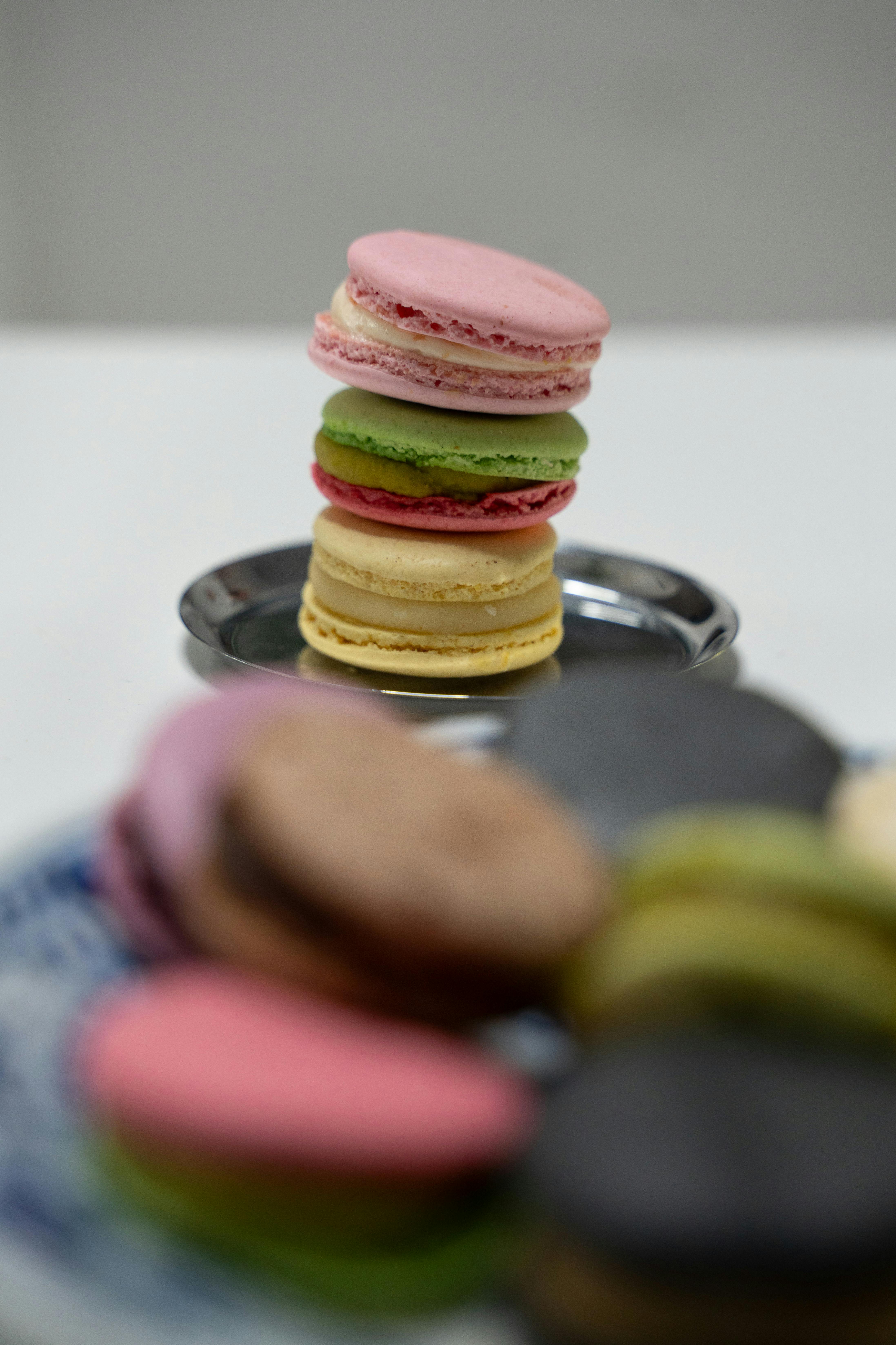 Colorful Macarons Stacked in a Modern Setting · Free Stock Photo