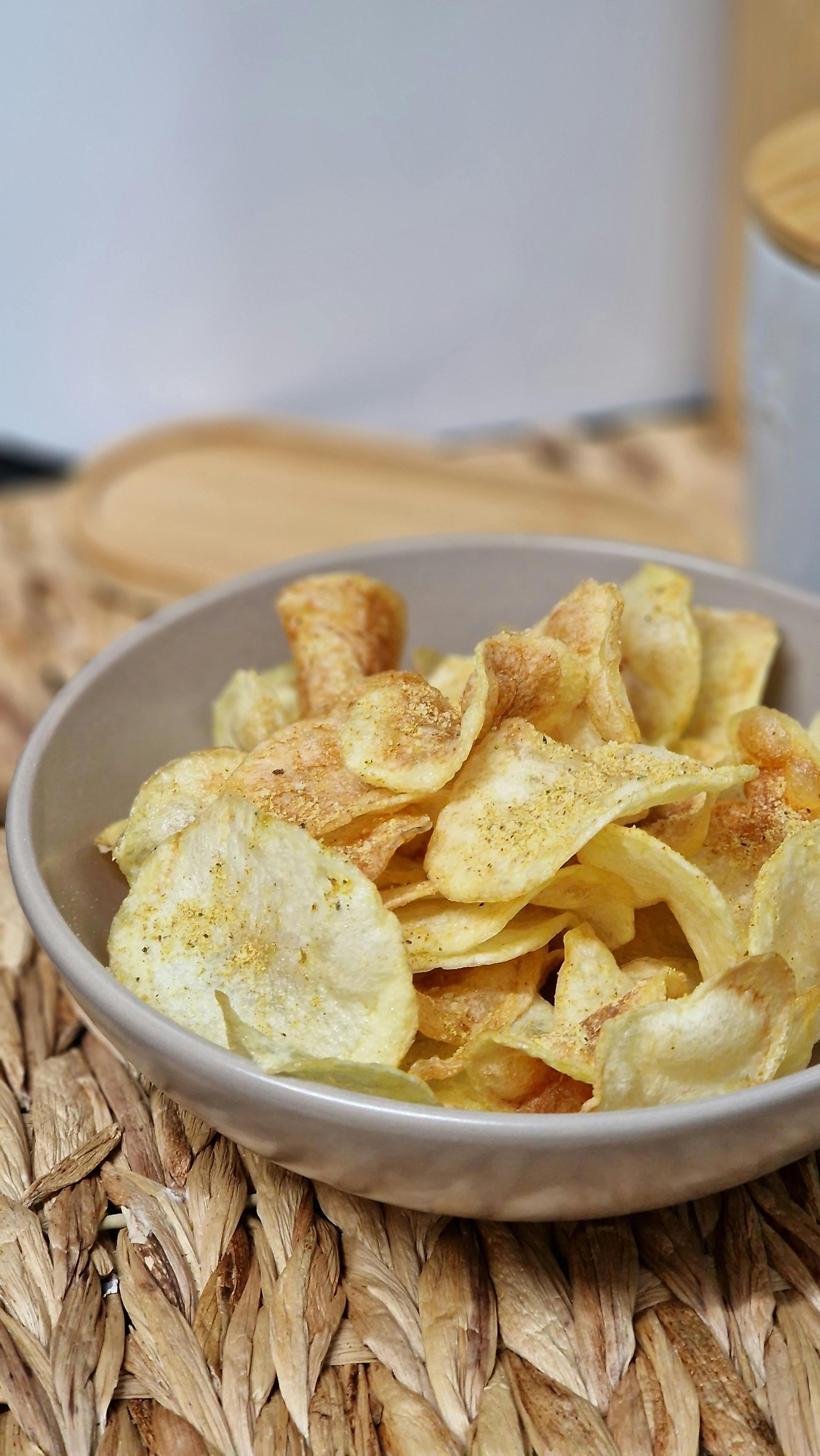 Crispy Potato Chips in Ceramic Bowl · Free Stock Photo