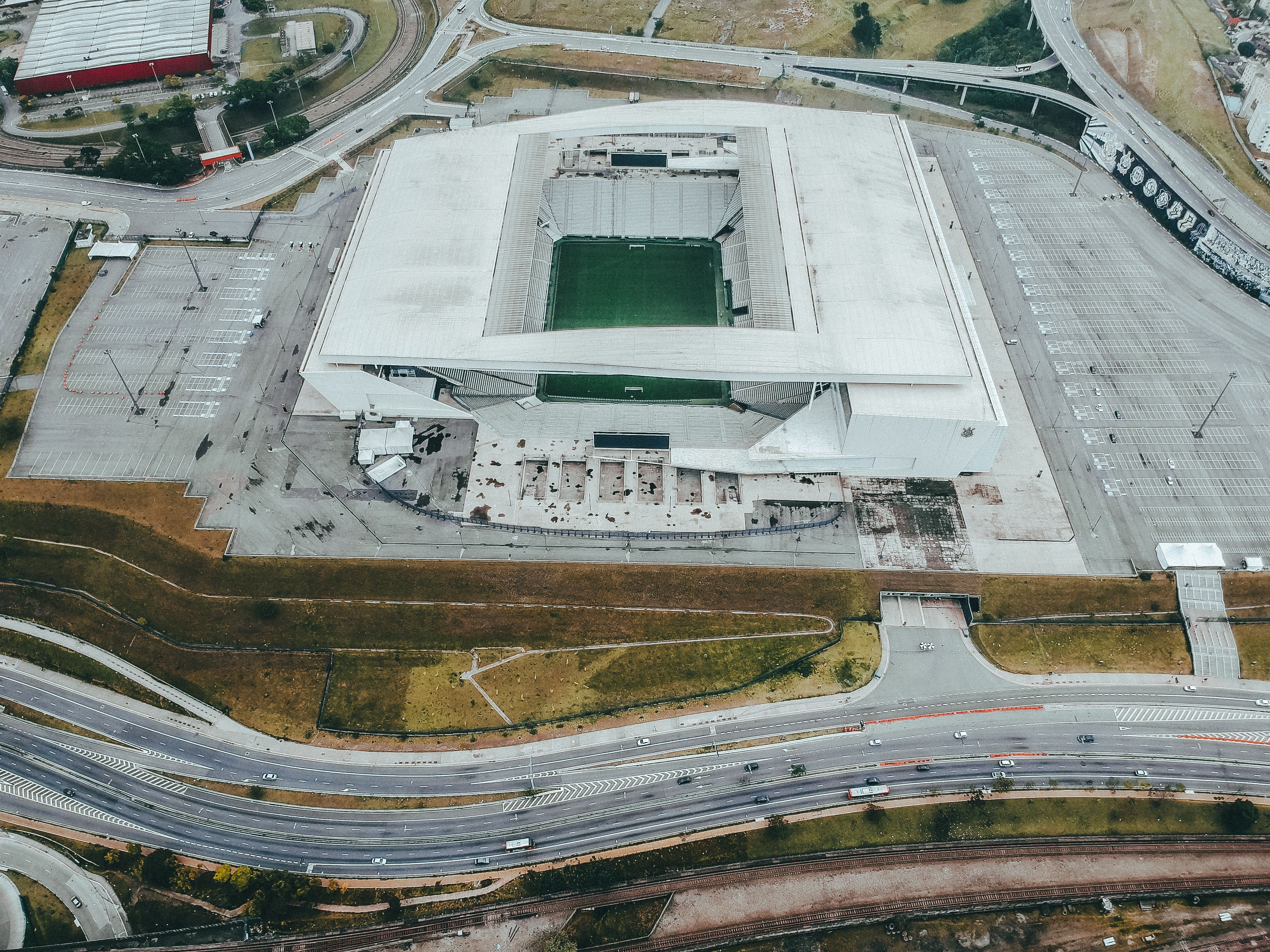 Aerial View of Modern Stadium with Empty Parking · Free Stock Photo