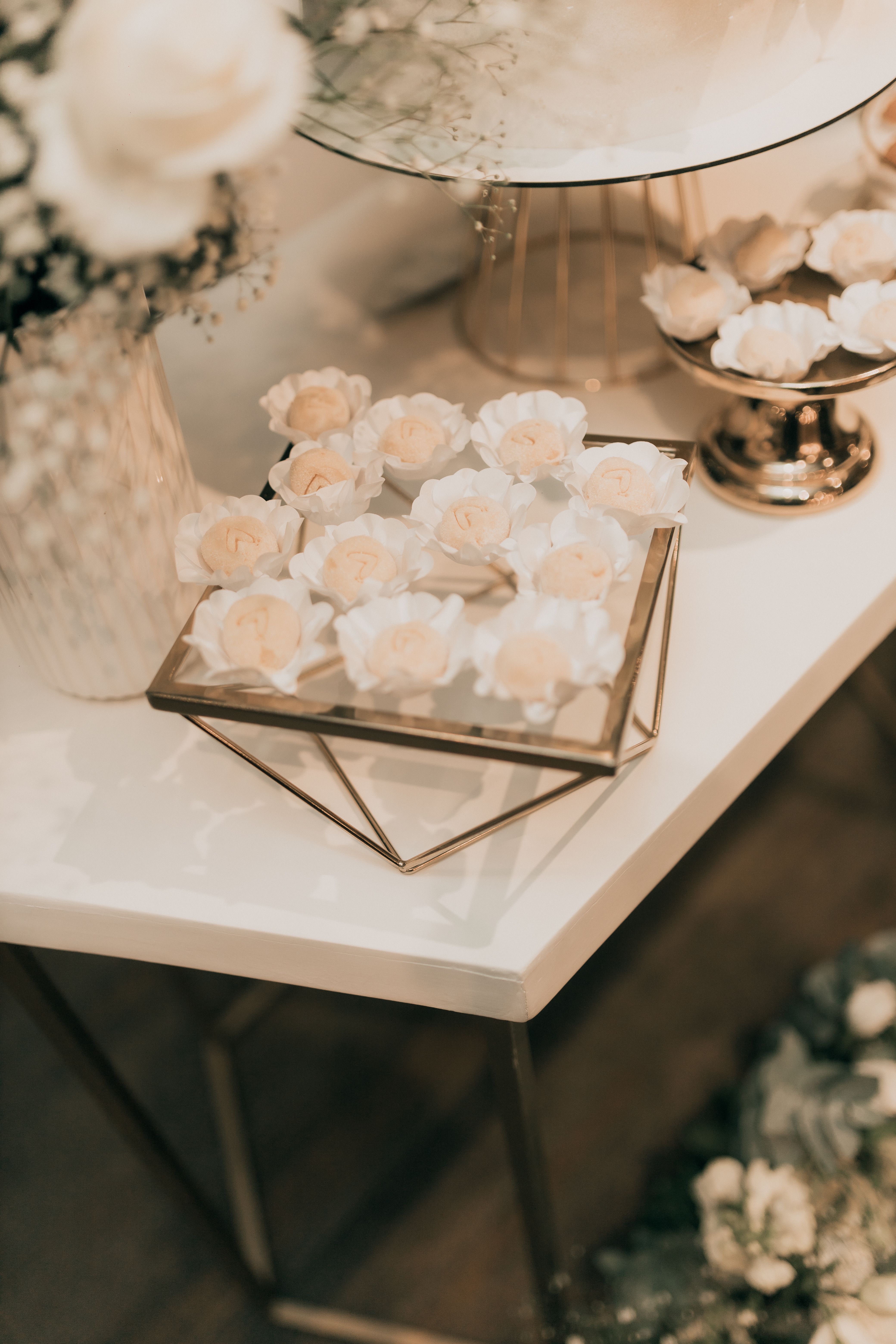 Elegant Wedding Dessert Table with Flower Decor · Free Stock Photo
