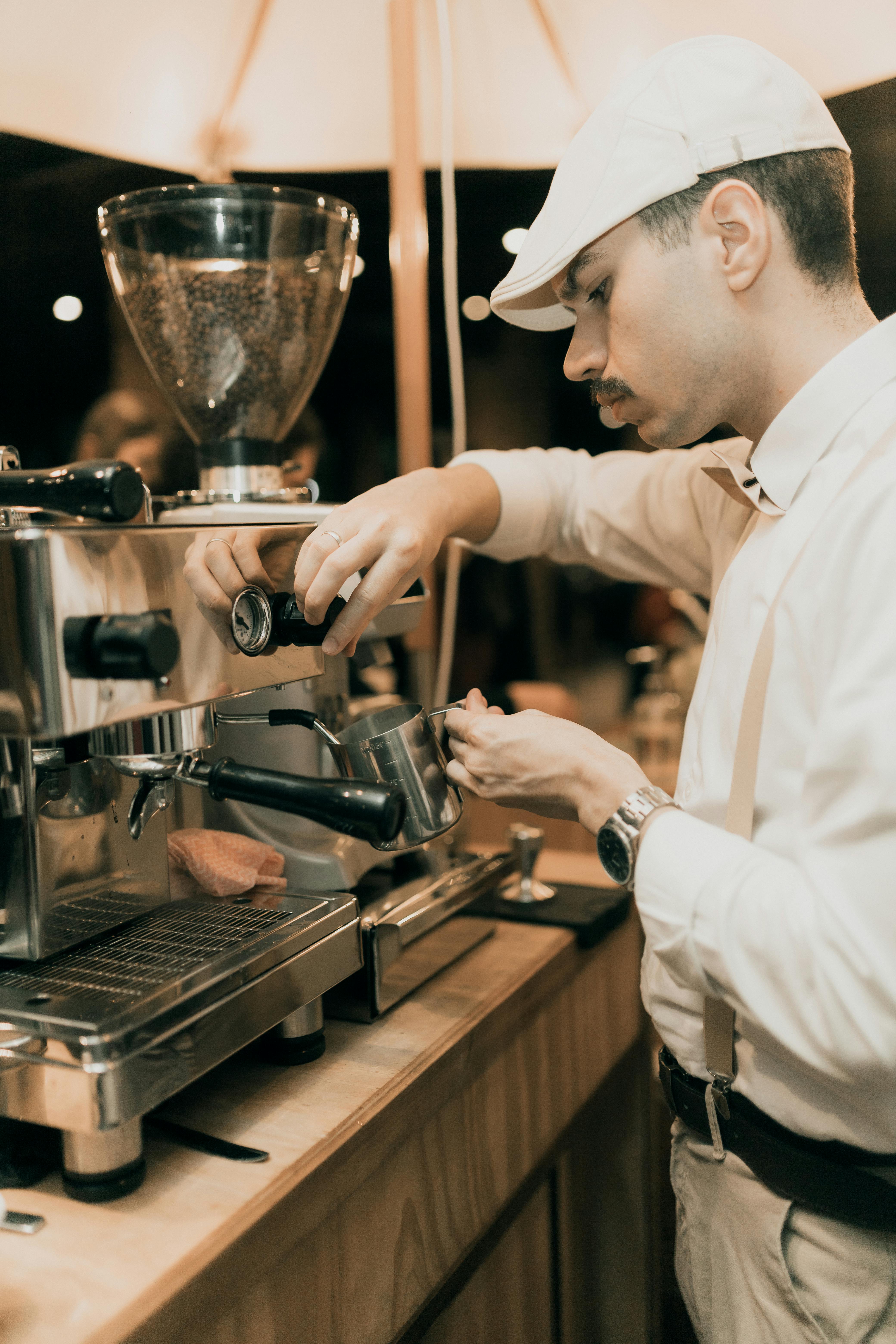 Barista Crafting Espresso Shot in Coffee Shop · Free Stock Photo