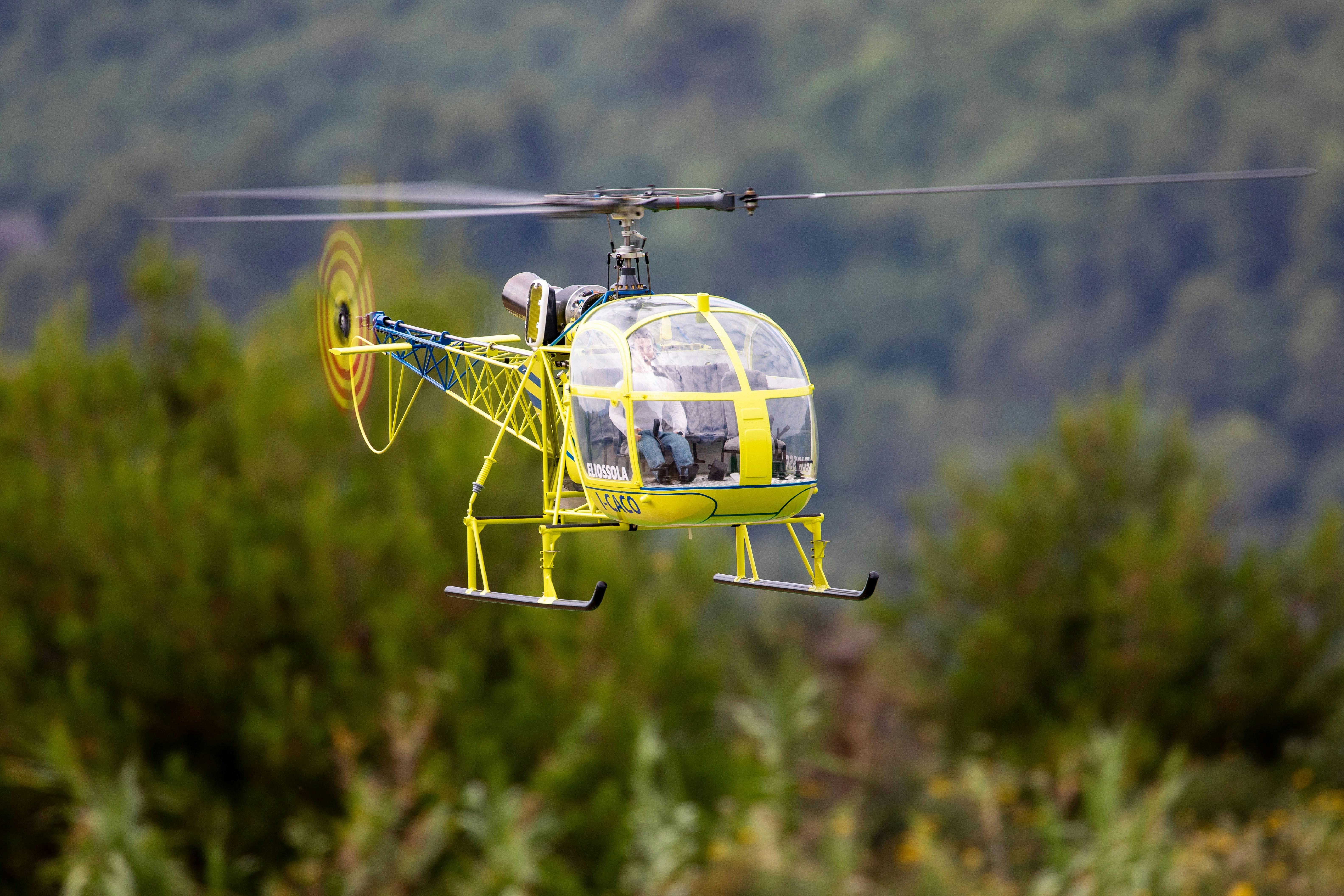 Aerial Firefighting Helicopter Over Greek River · Free Stock Photo