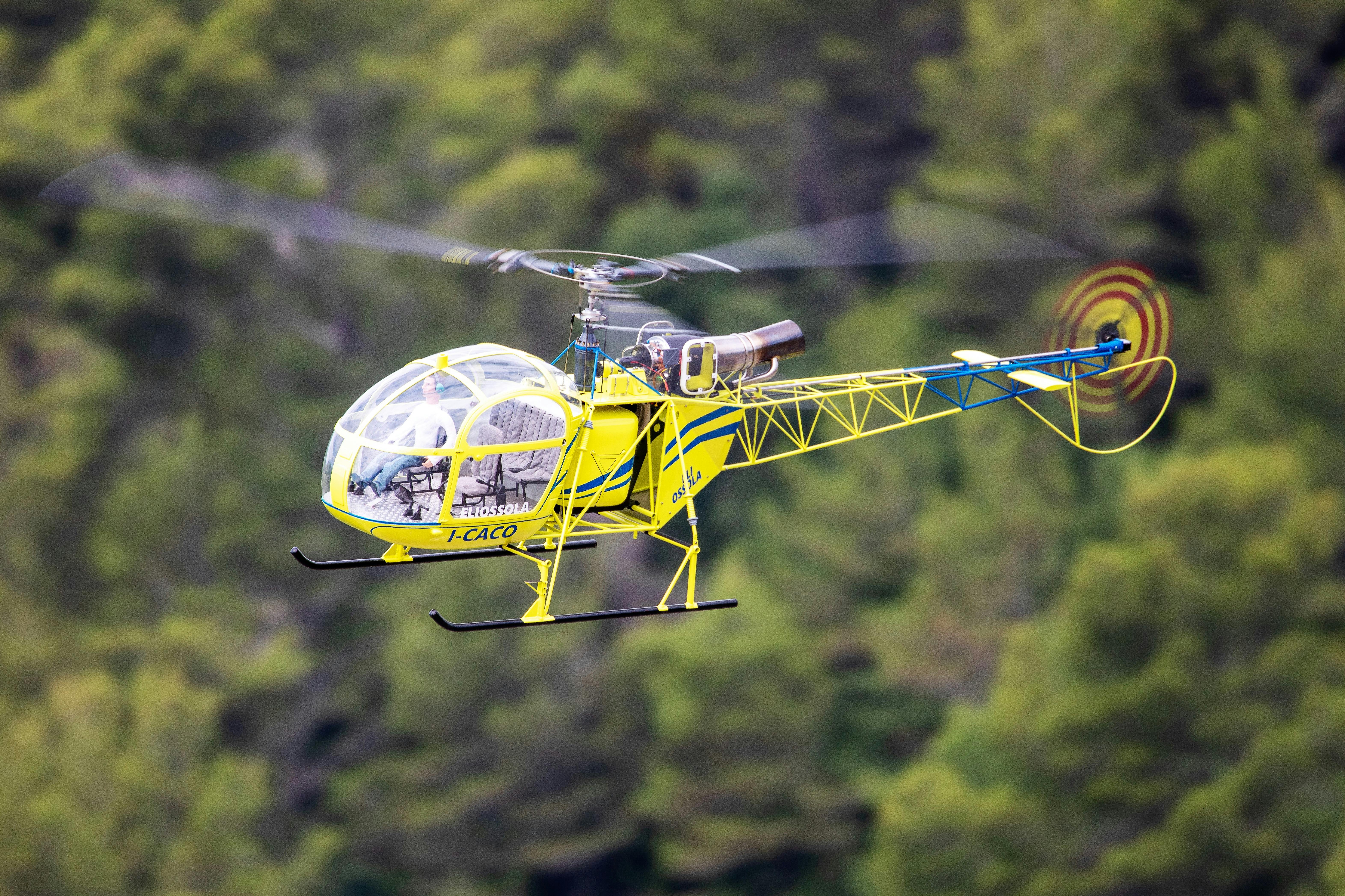 Aerial Firefighting Helicopter Over Greek River · Free Stock Photo