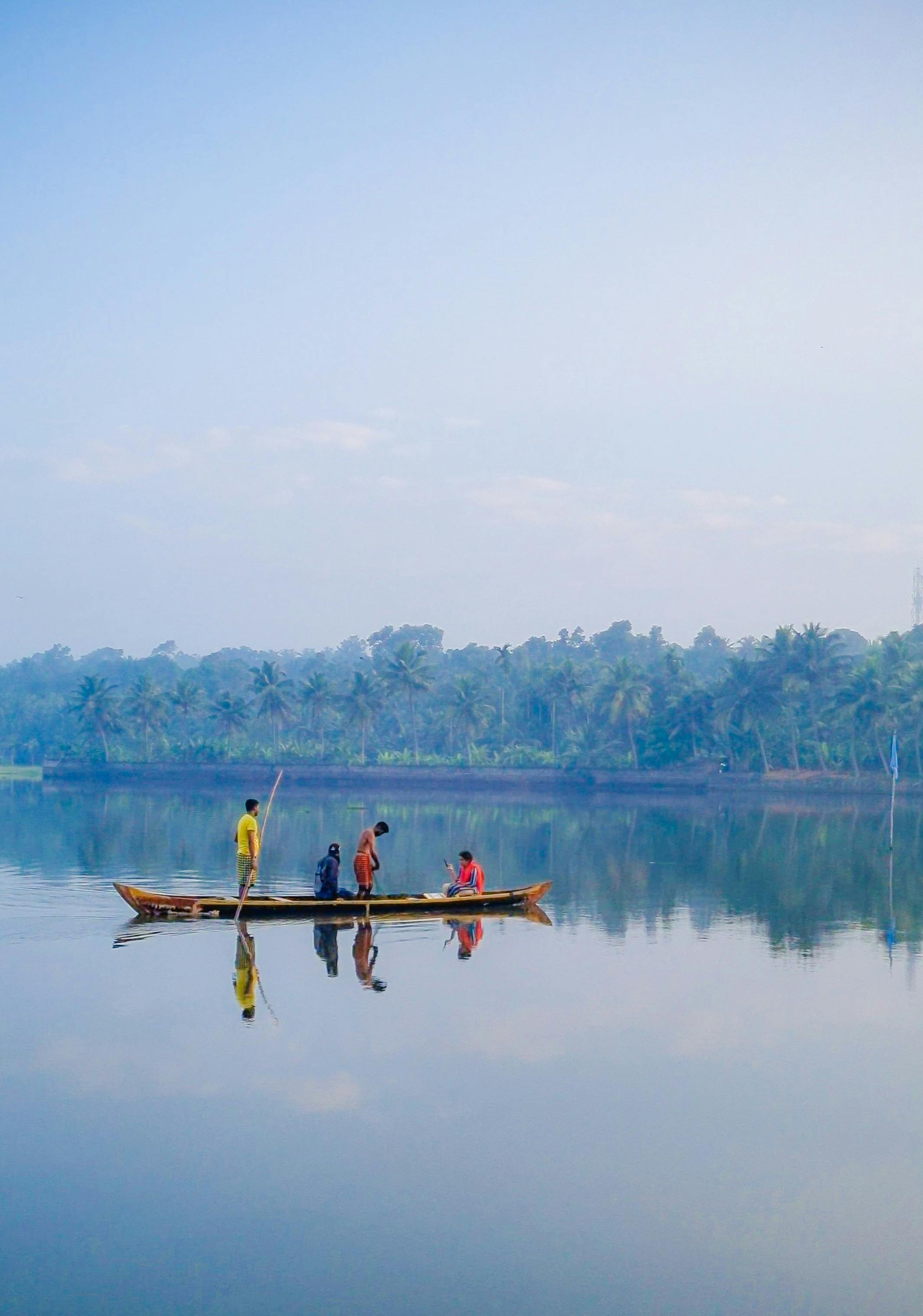 Tranquil Canoe Ride at Vellayani Lake Kerala · Free Stock Photo
