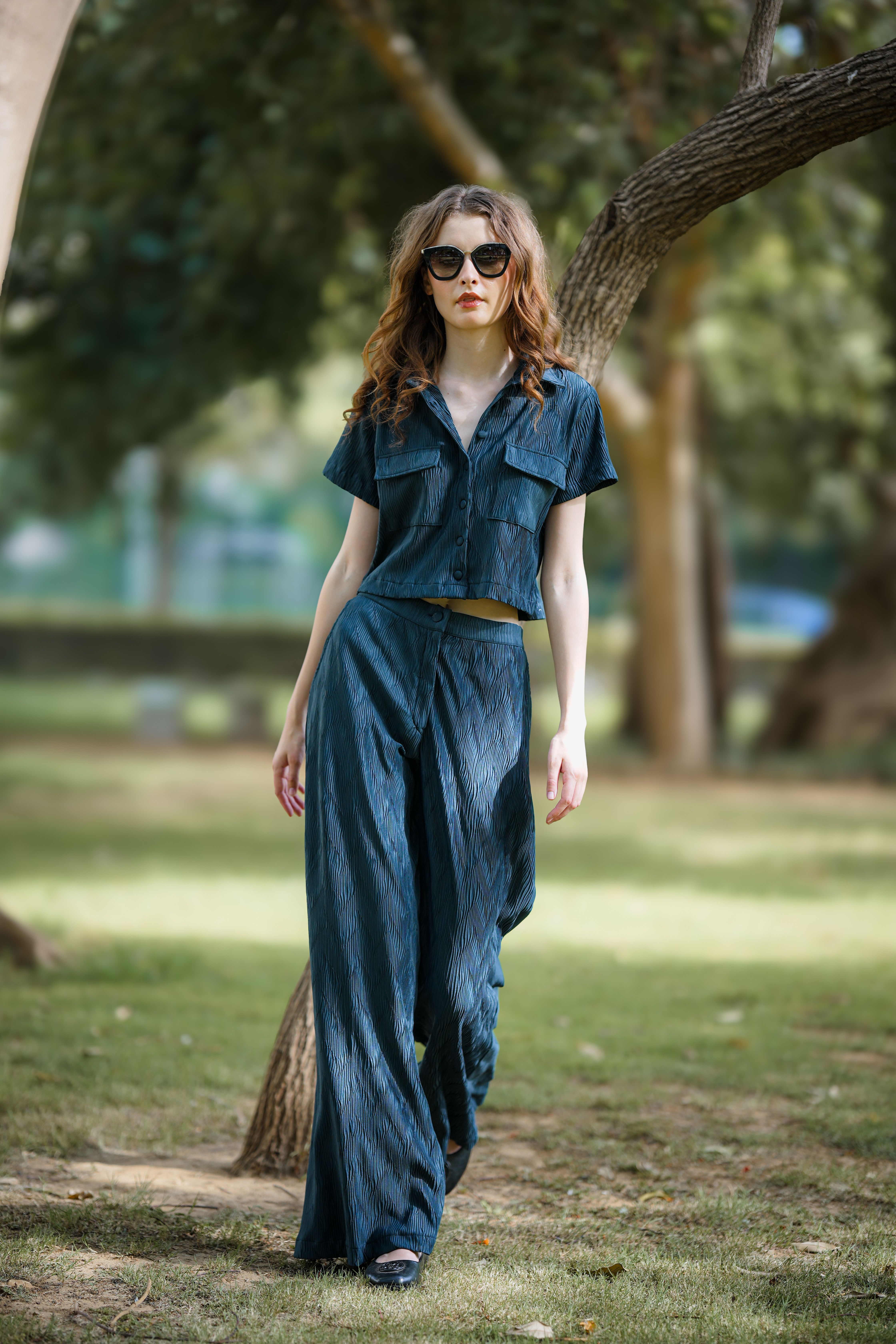 Fashionable Woman Walking in Stylish Outfit Outdoors · Free Stock Photo