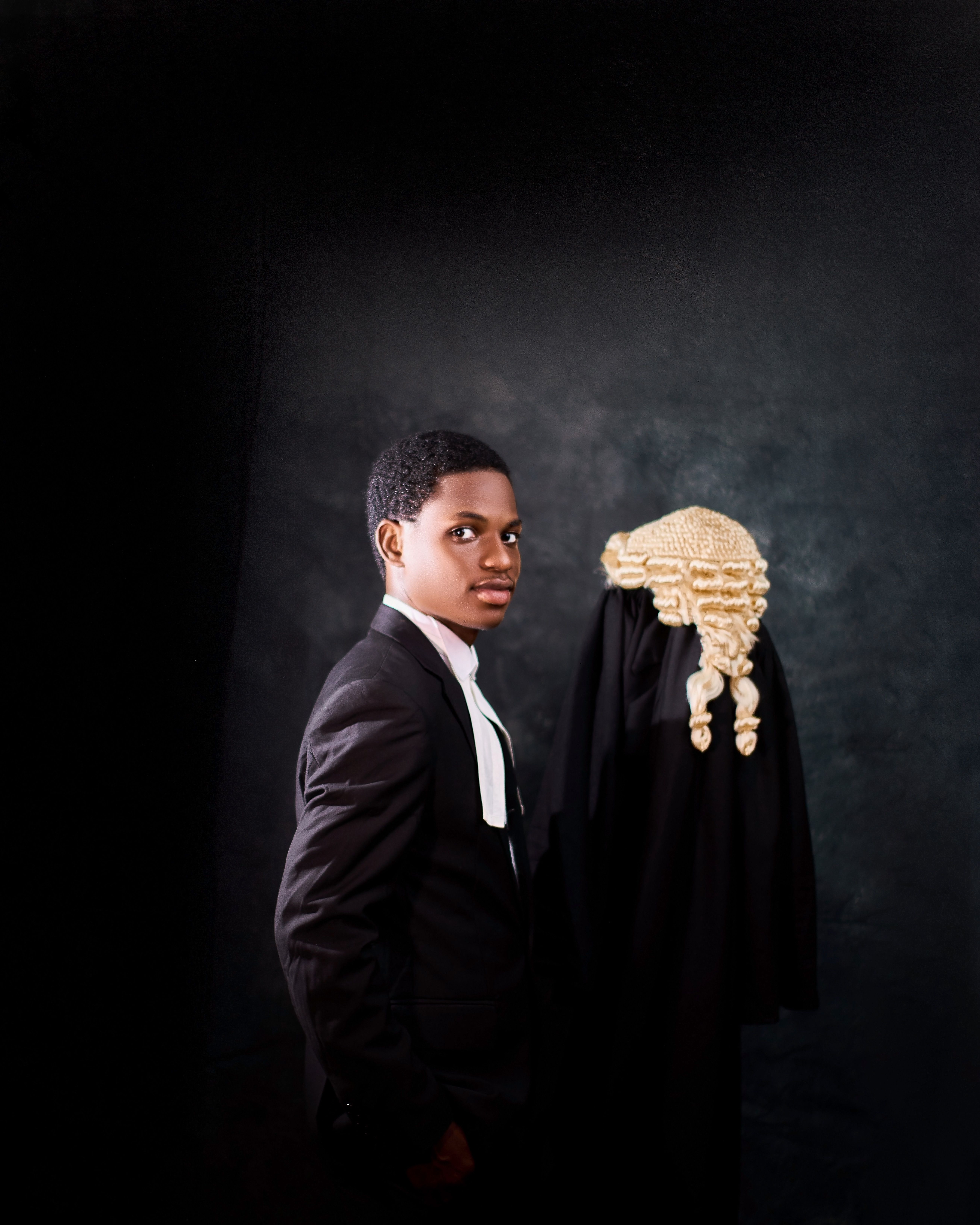 Young Barrister in a Suit with Legal Gown · Free Stock Photo