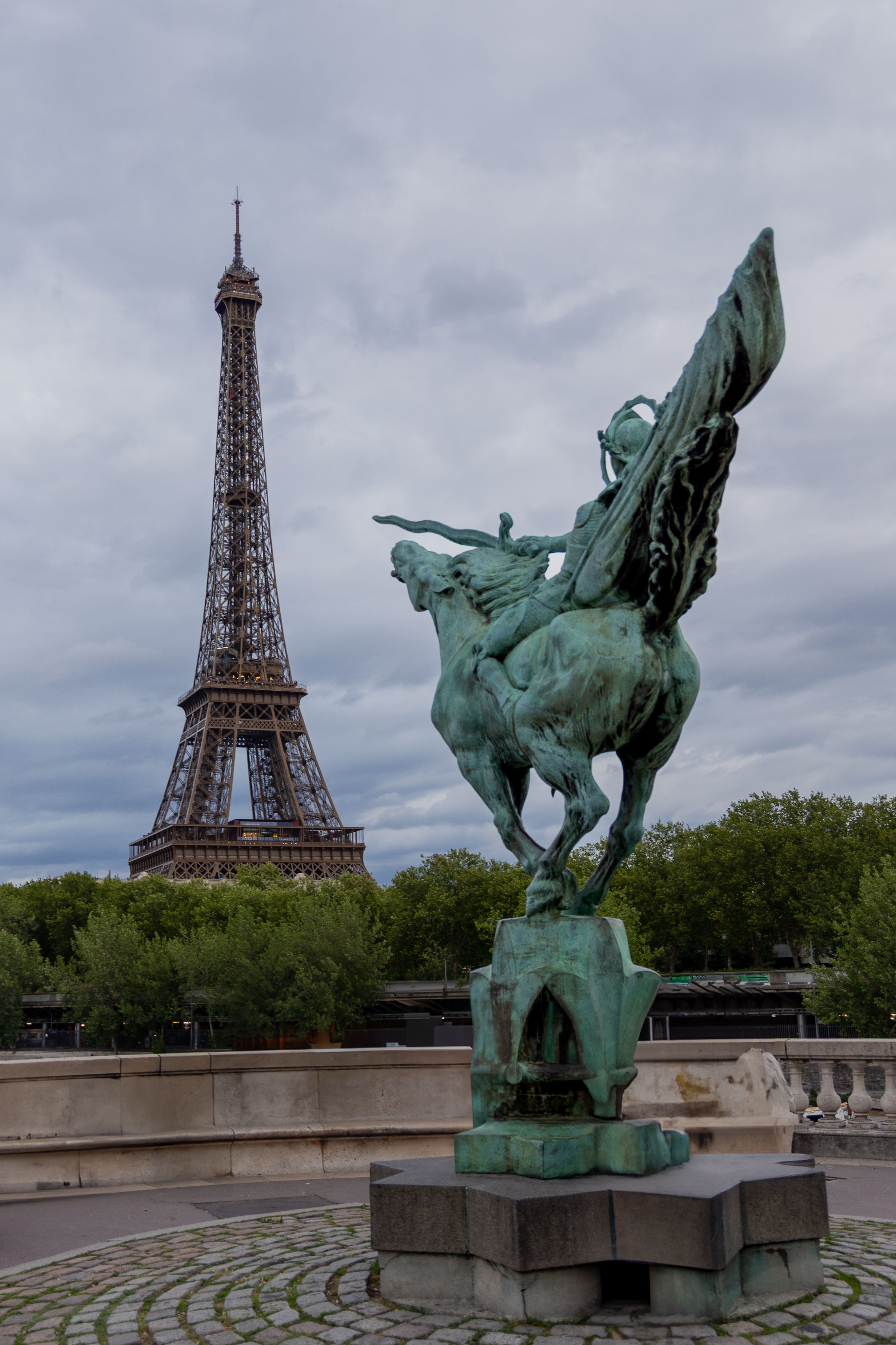 Eiffel Tower and Bronze Pegasus Statue in Paris · Free Stock Photo