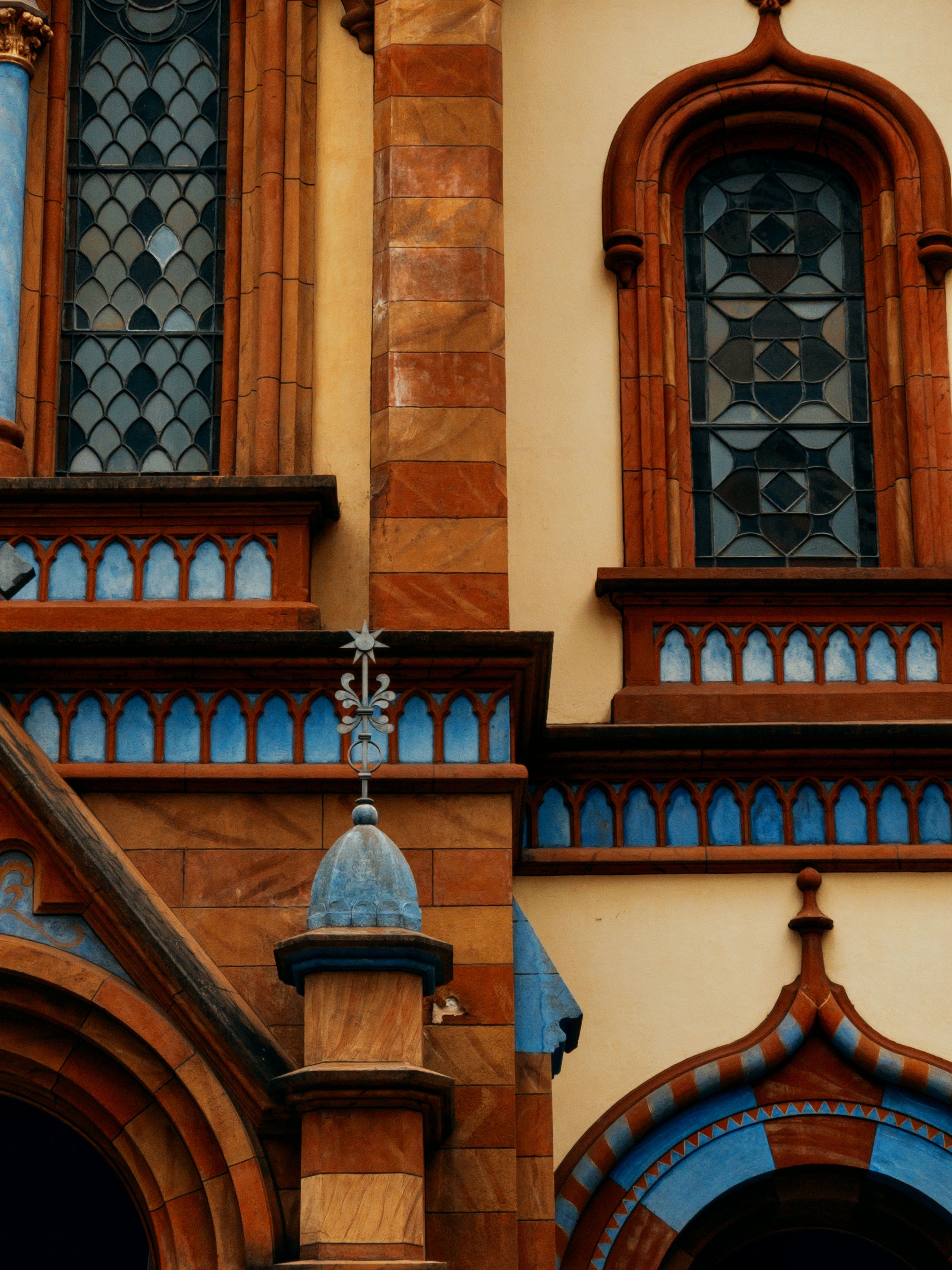 Colorful Gothic Architectural Details on Church Facade · Free Stock Photo