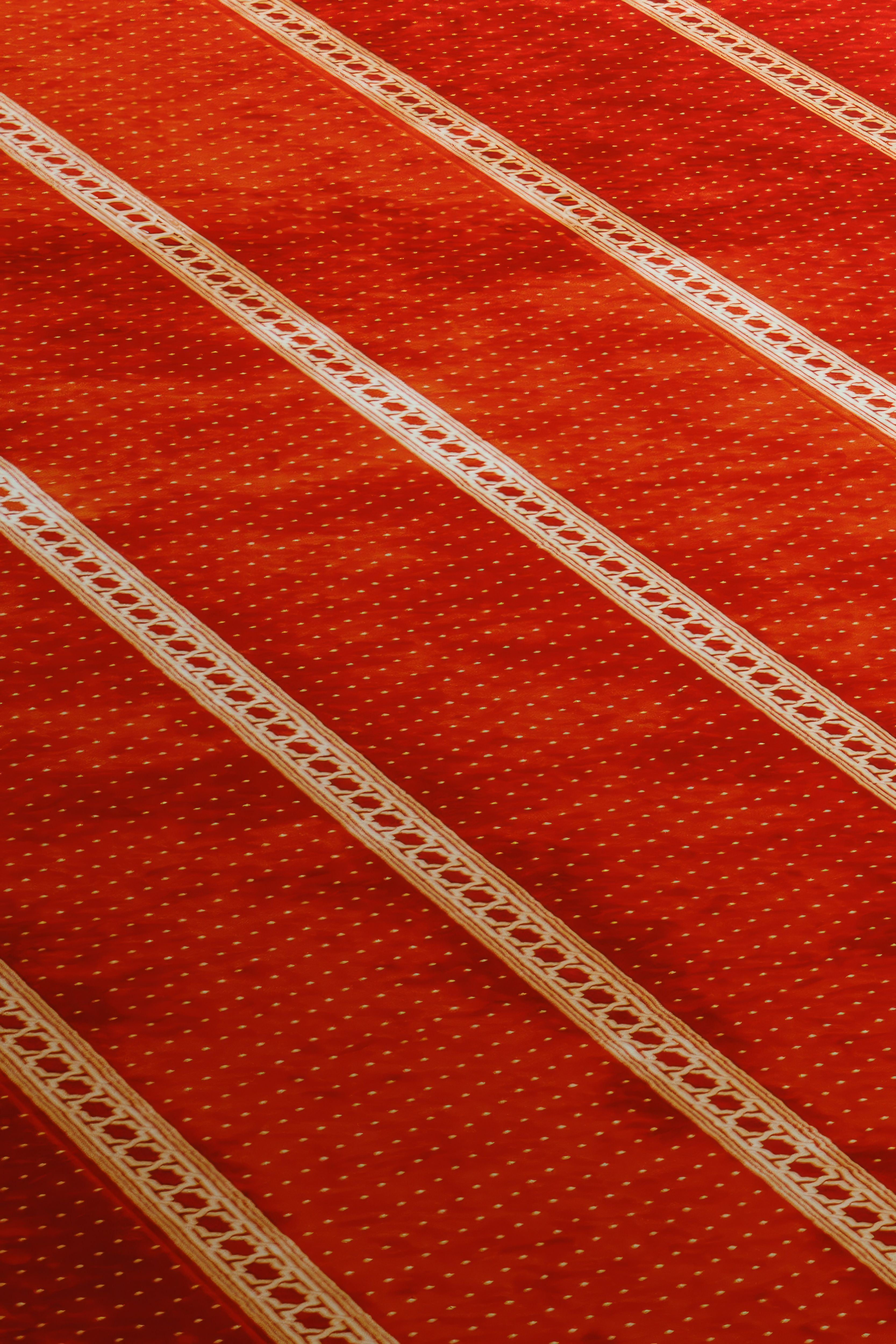 Intricate Islamic Geometric Pattern on Mosque Carpet · Free Stock Photo