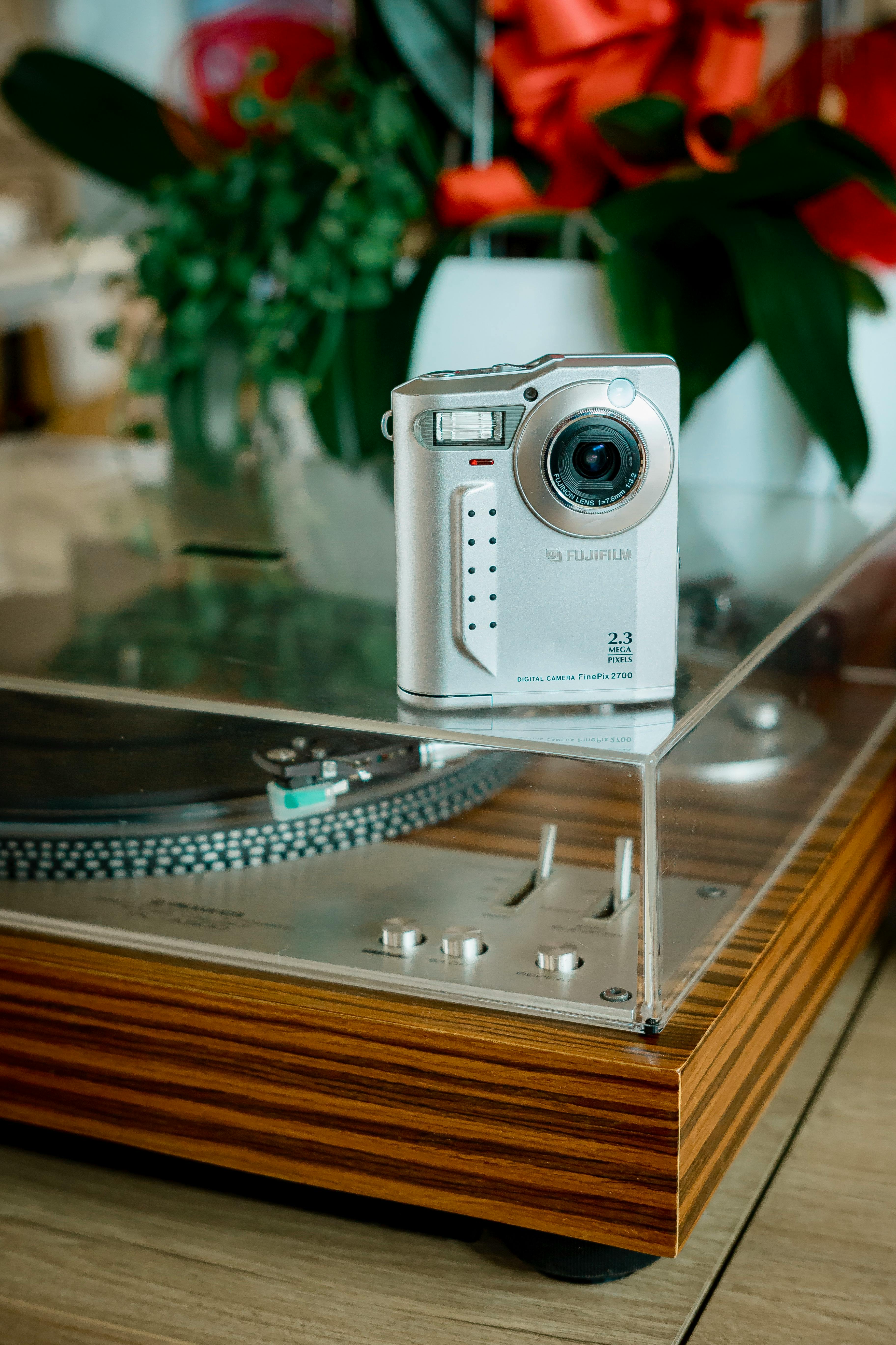 Vintage Camera on Turntable with Plants · Free Stock Photo