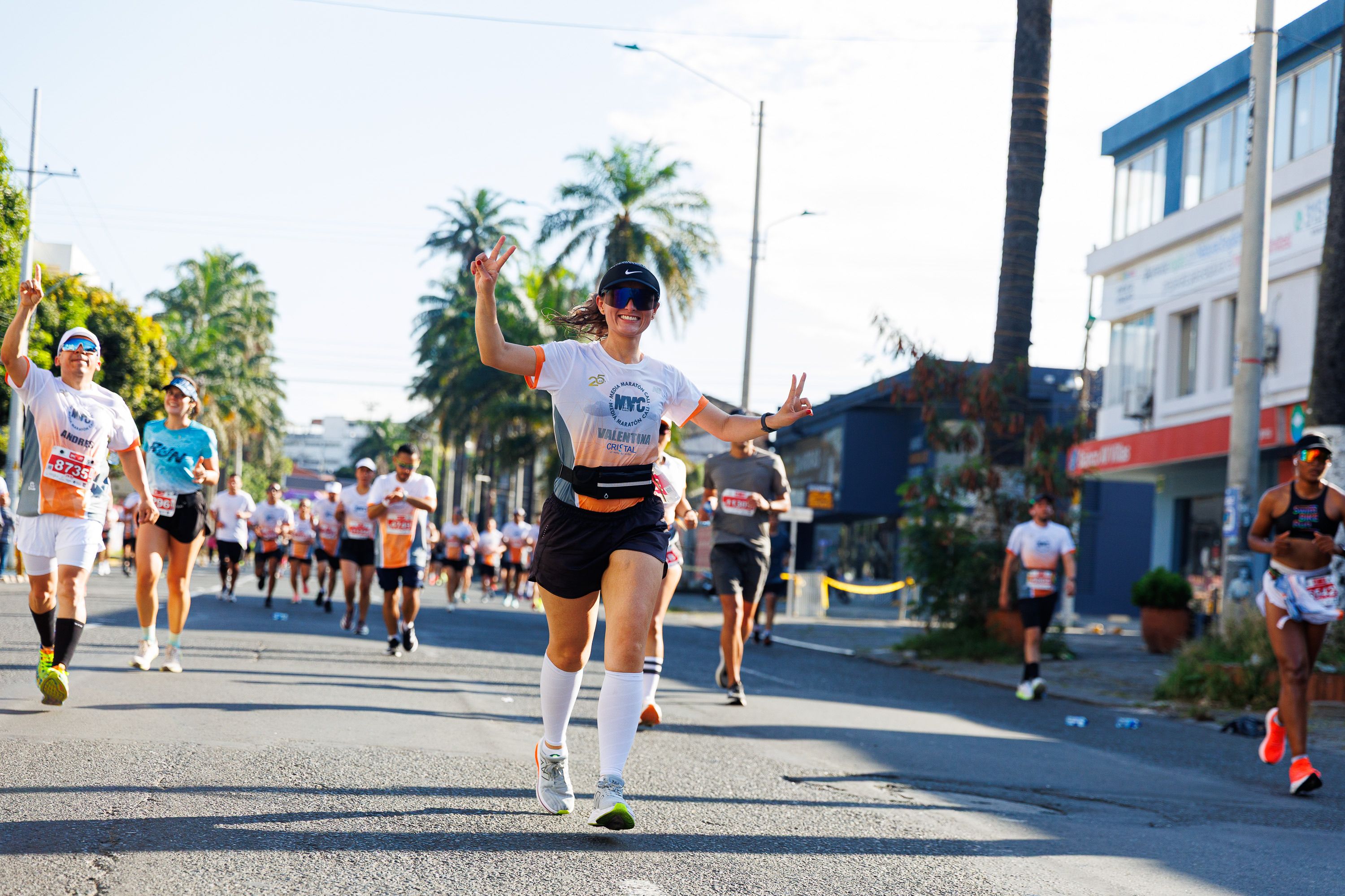 Dynamic Marathon Runners in City Street Race · Free Stock Photo
