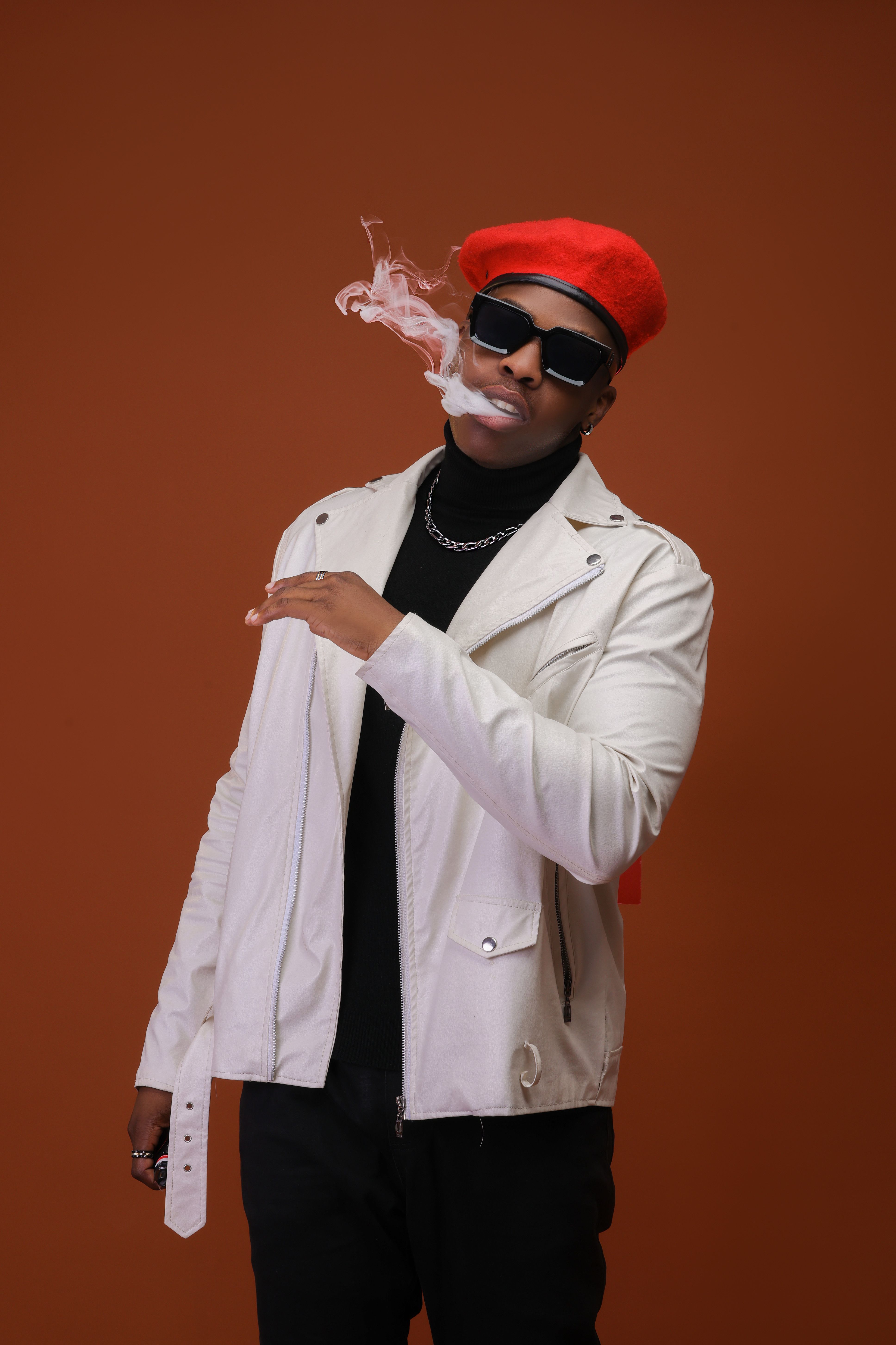 Stylish Man Smoking with Red Beret and Shades · Free Stock Photo