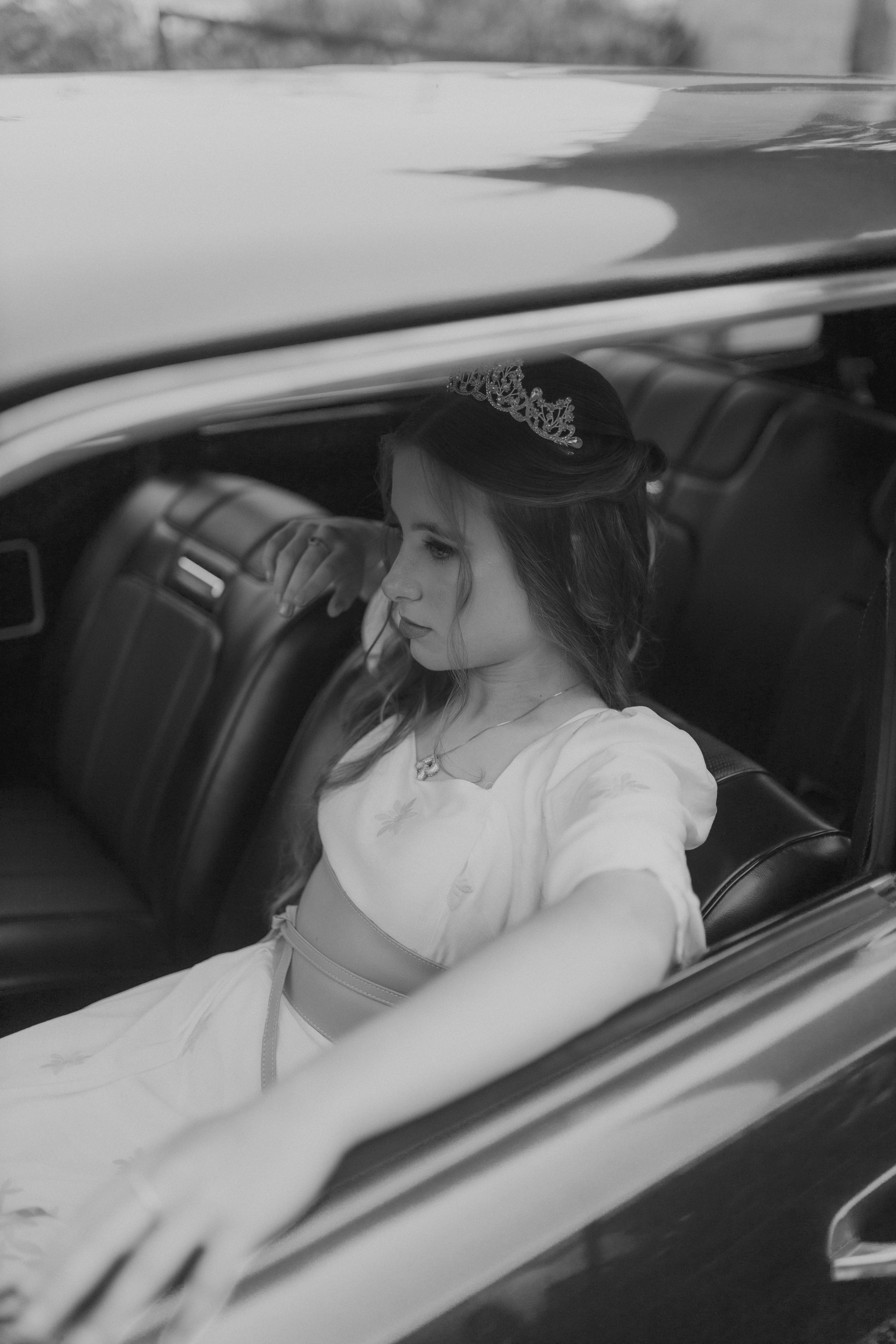 Black and White Portrait of Girl in Car · Free Stock Photo