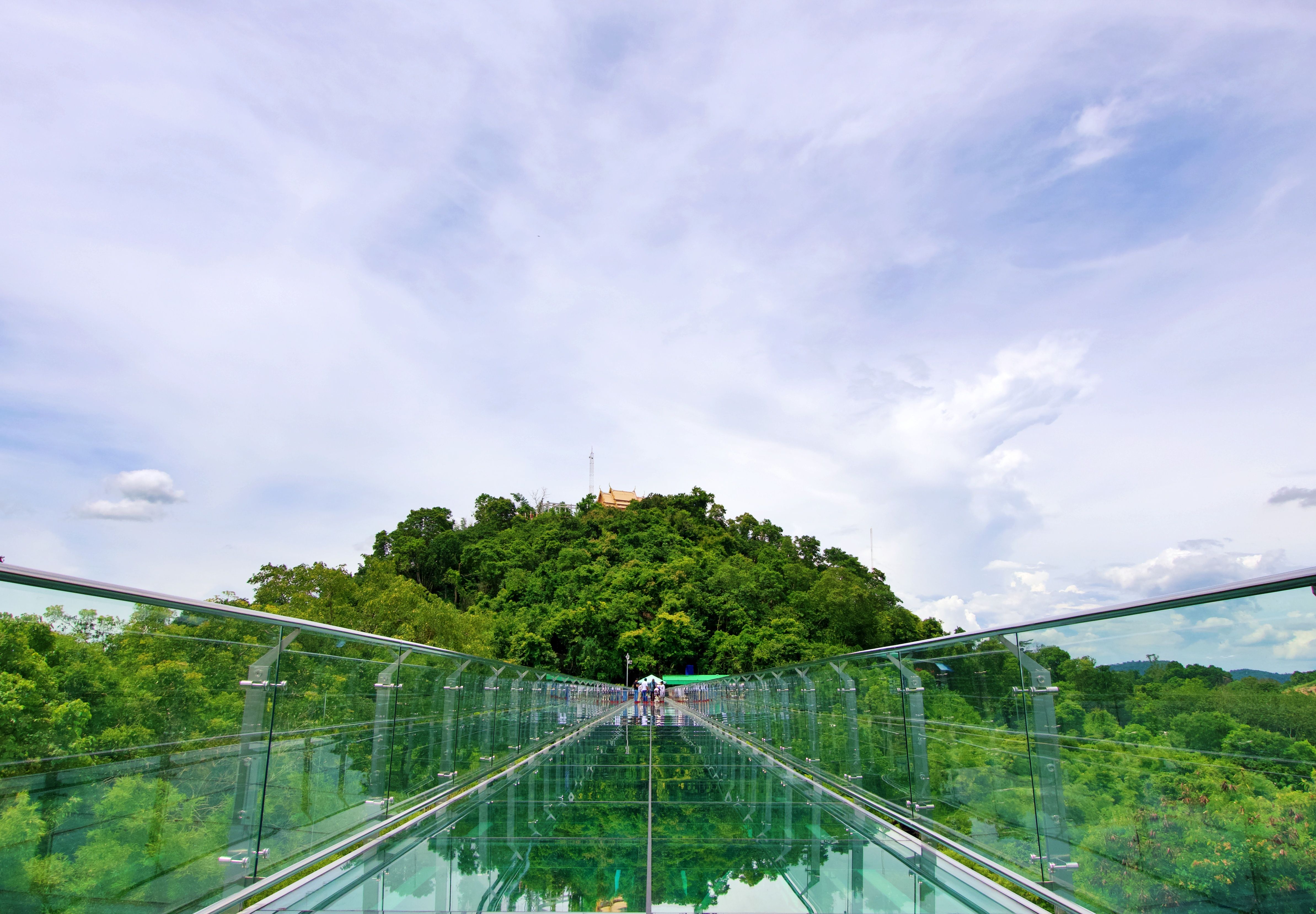Scenic Glass Skywalk Leading to Temple in Thailand · Free Stock Photo