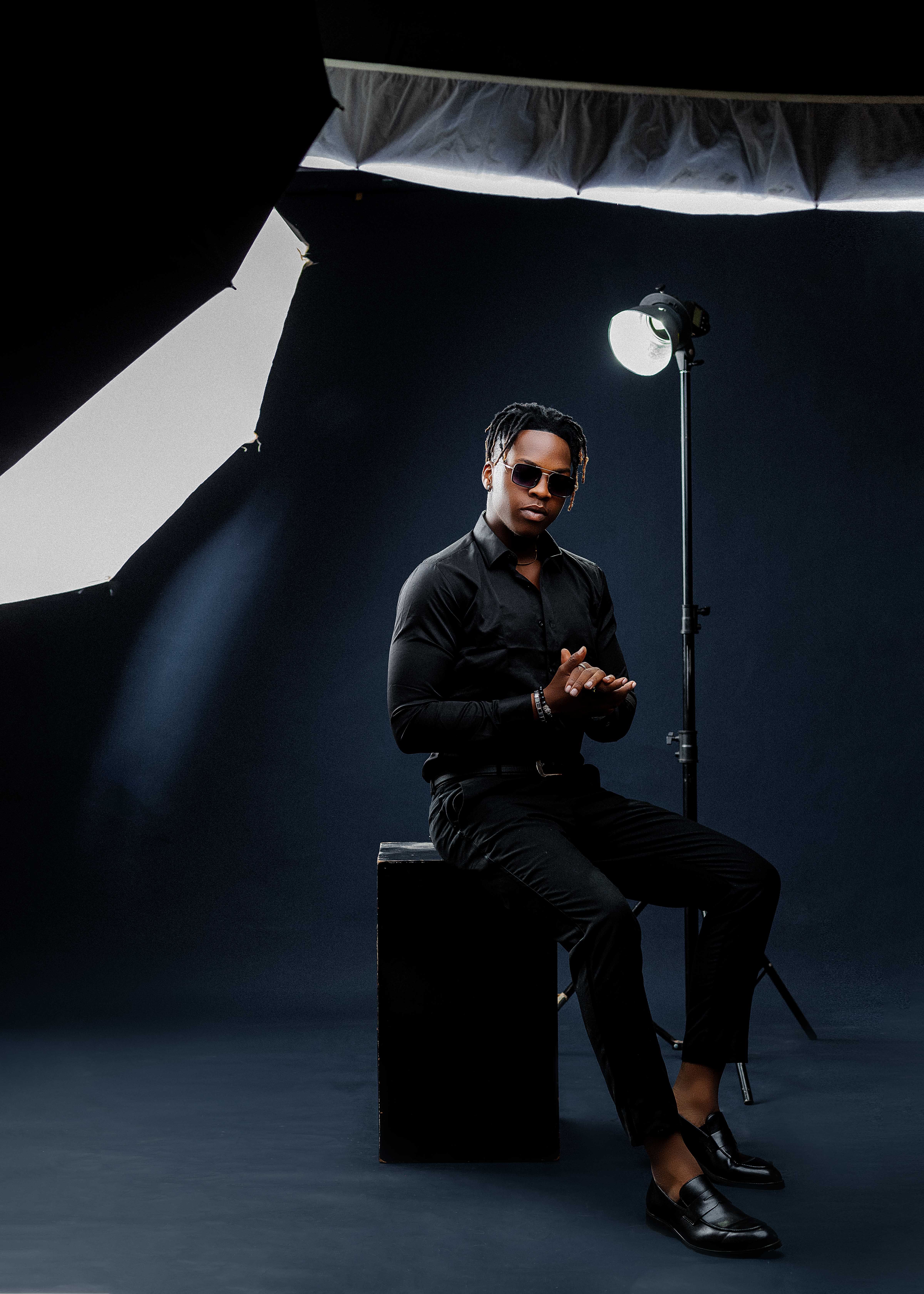 Stylish Man Posing in Photography Studio · Free Stock Photo