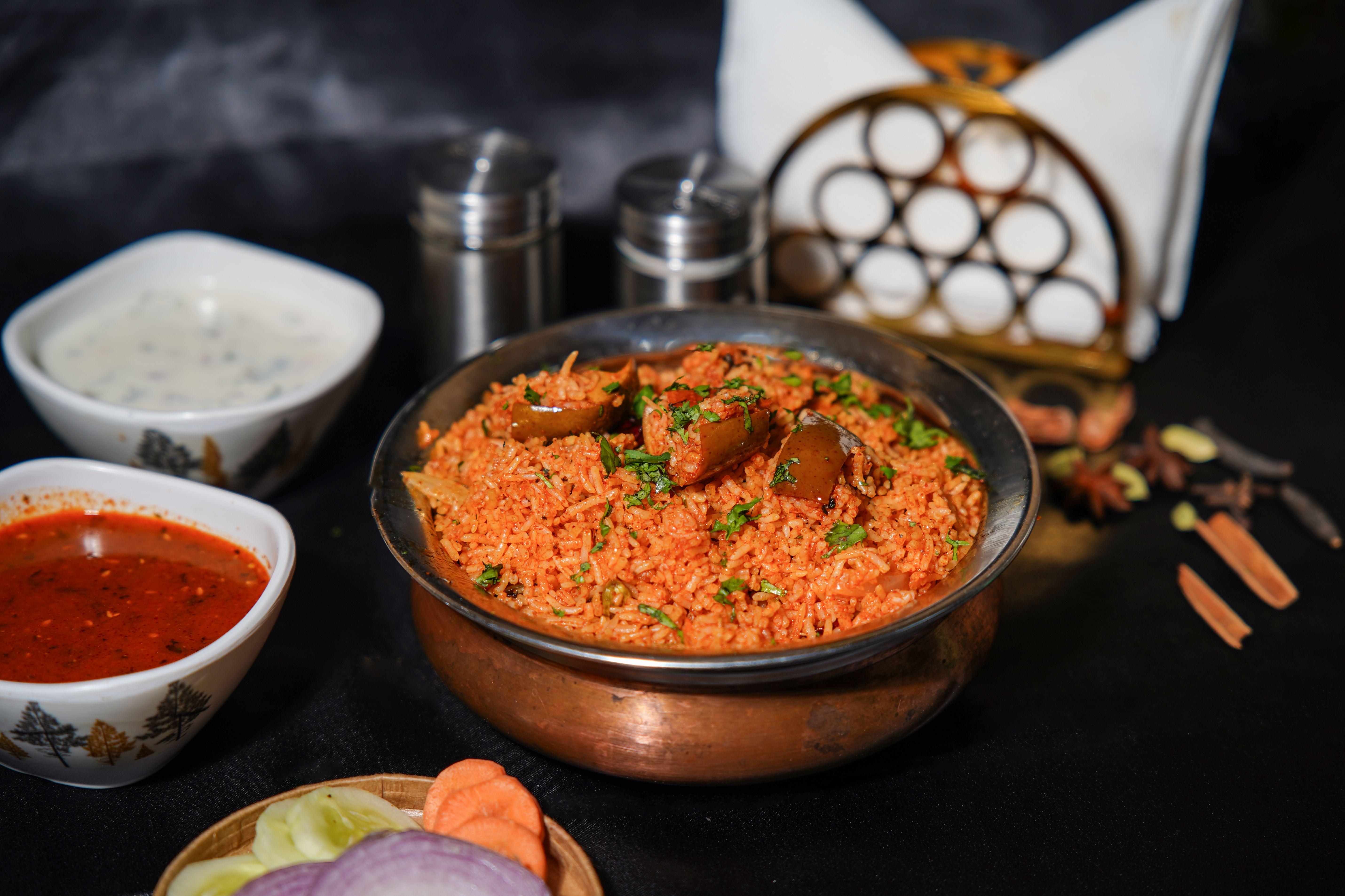 Authentic Indian Biryani with Spices and Condiments · Free Stock Photo