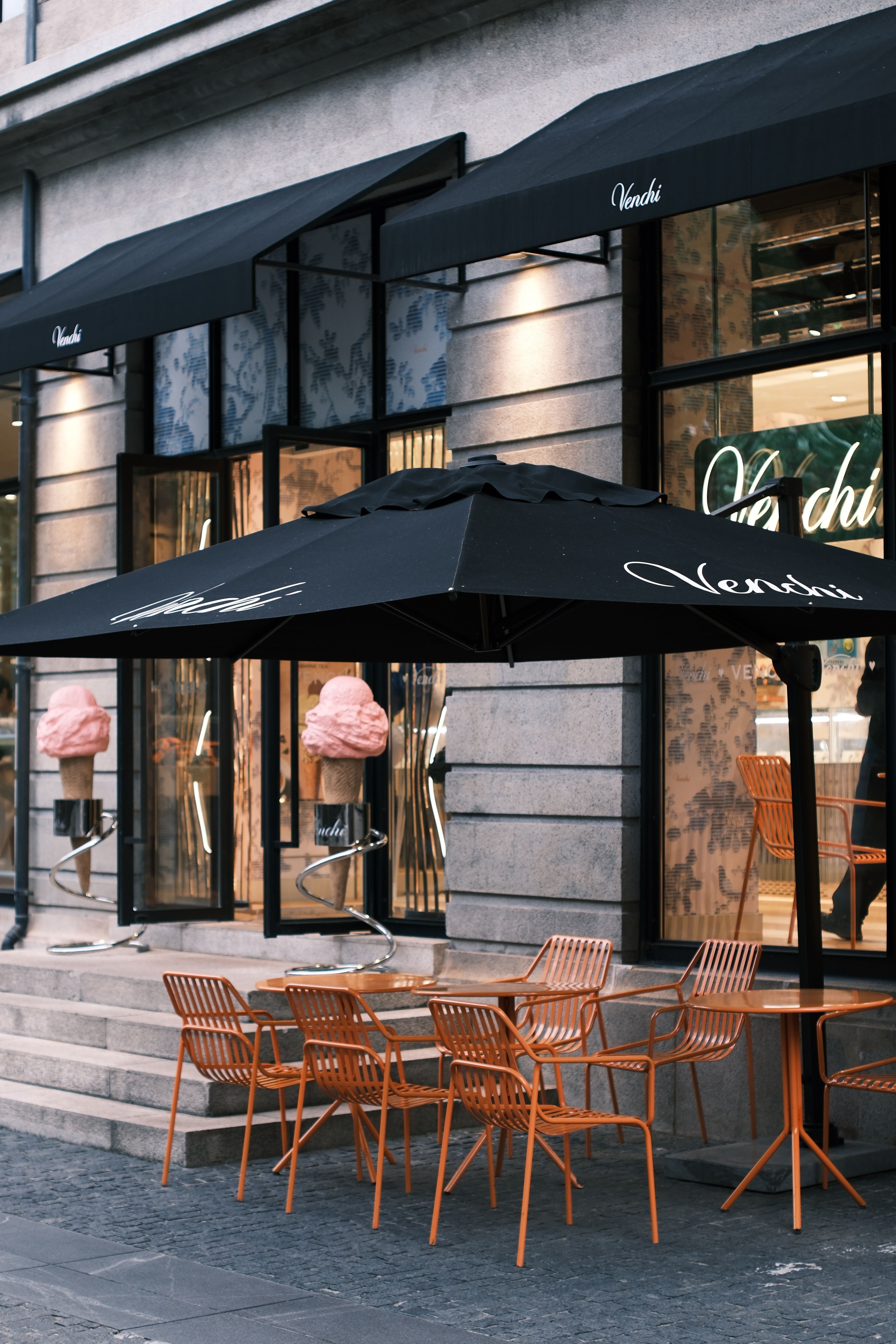 Chic Urban Cafe Exterior with Modern Design · Free Stock Photo