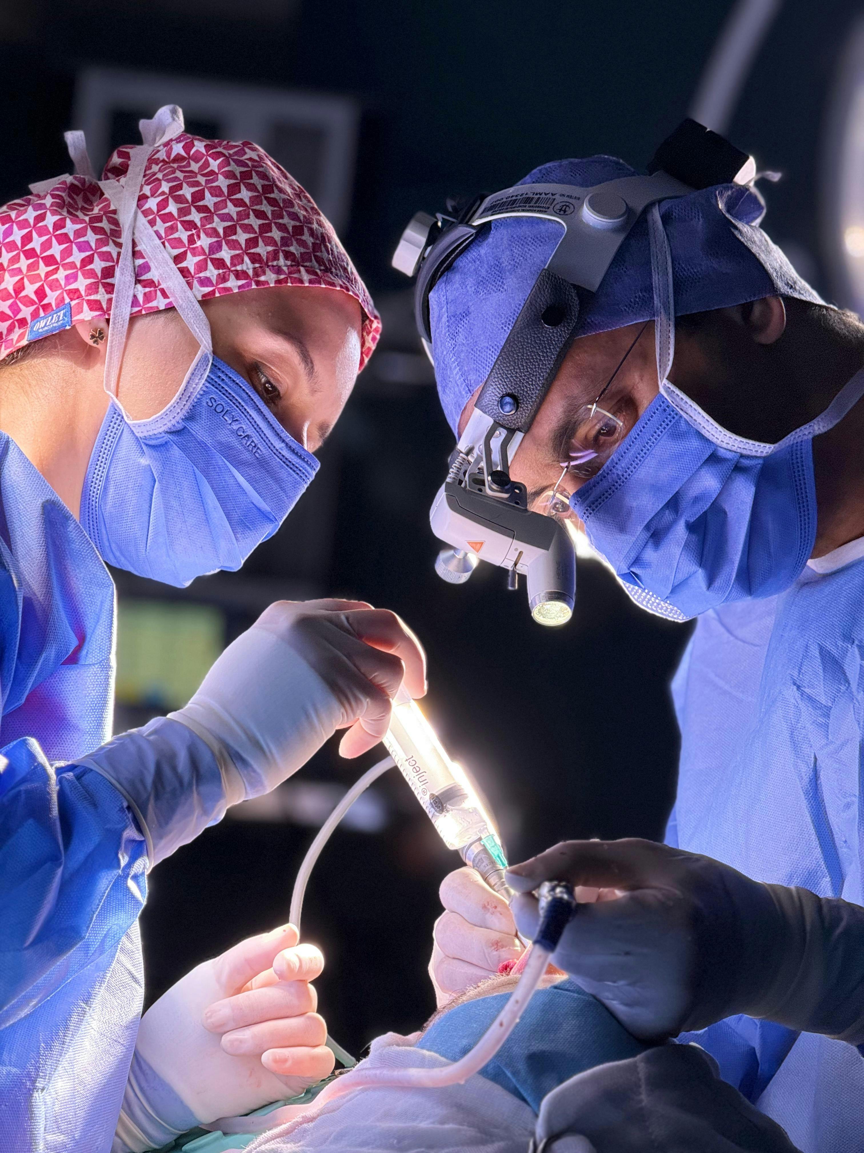 Surgeons Performing Surgery in Operating Room · Free Stock Photo