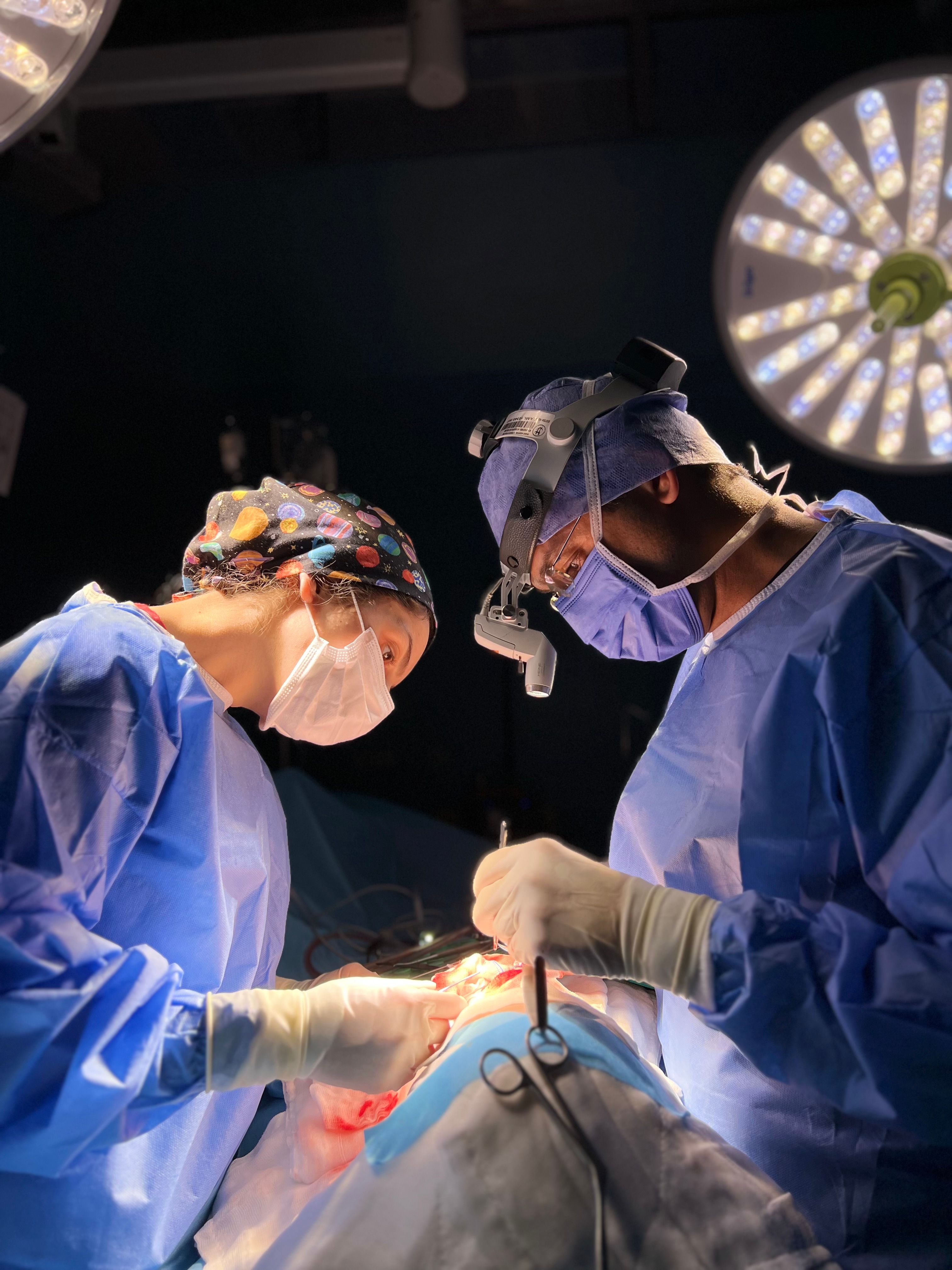 Surgeons Performing Critical Surgery in Operating Room · Free Stock Photo