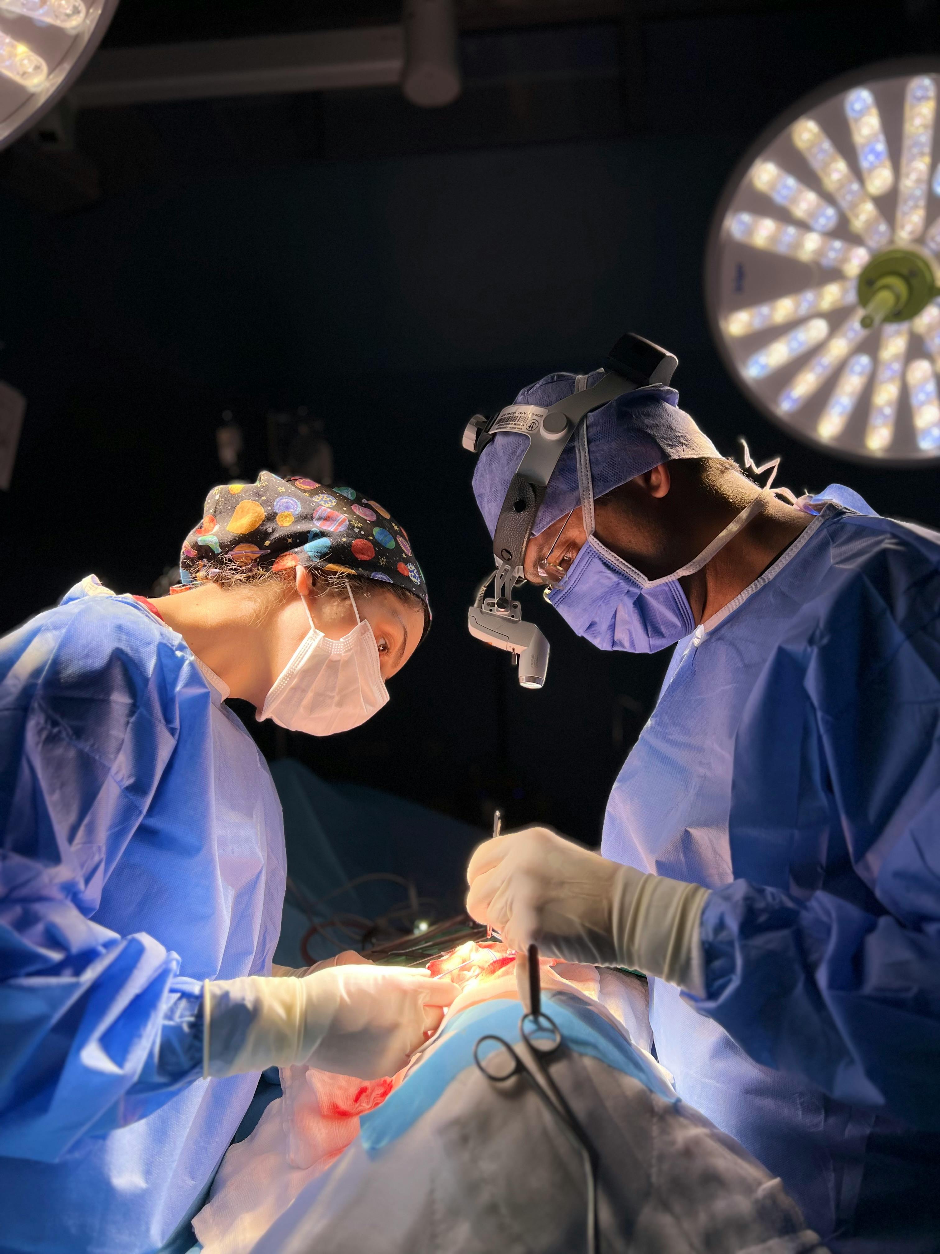 Surgeons Performing Critical Surgery in Operating Room · Free Stock Photo