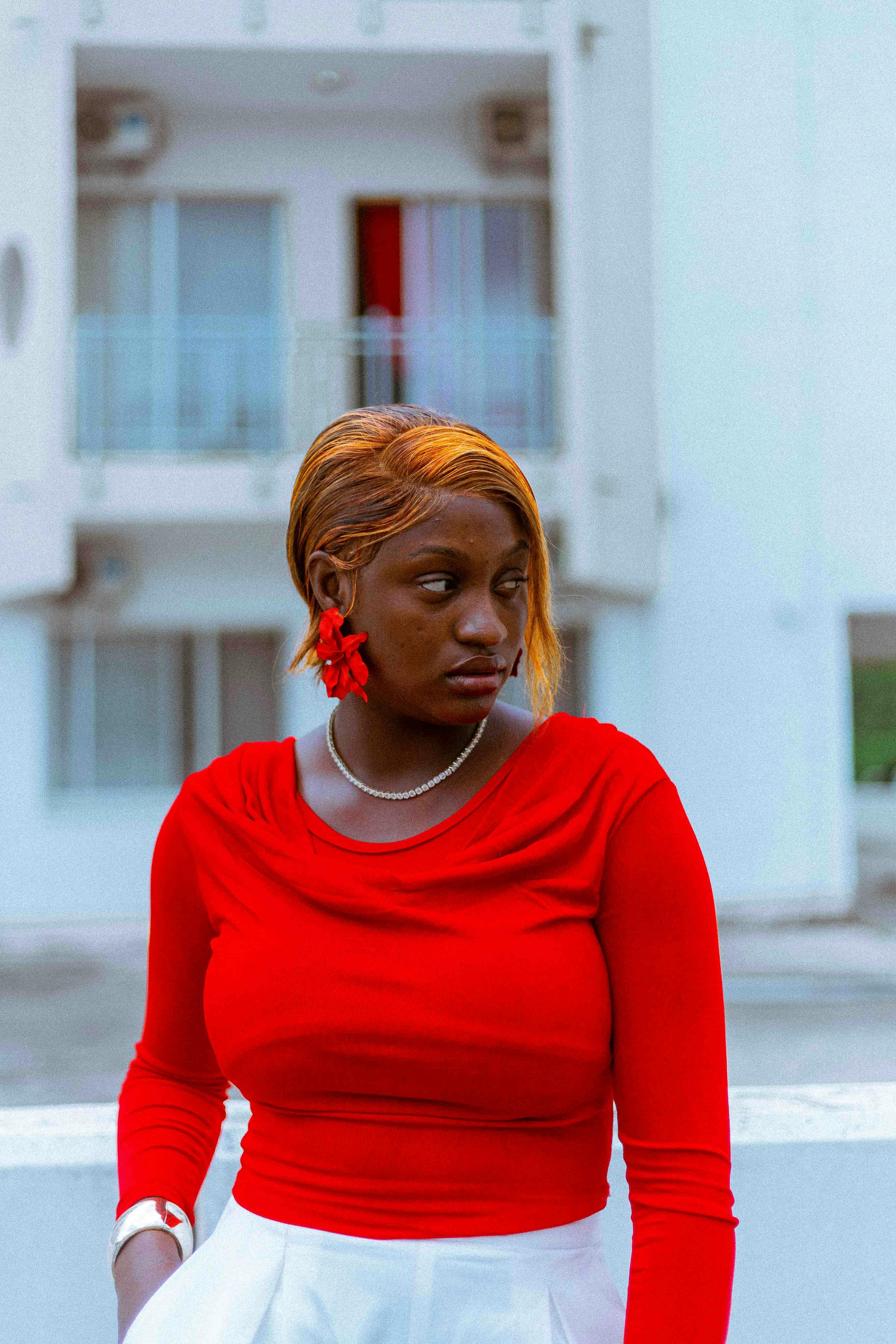 Stylish Woman in Red Outfit Outdoors · Free Stock Photo