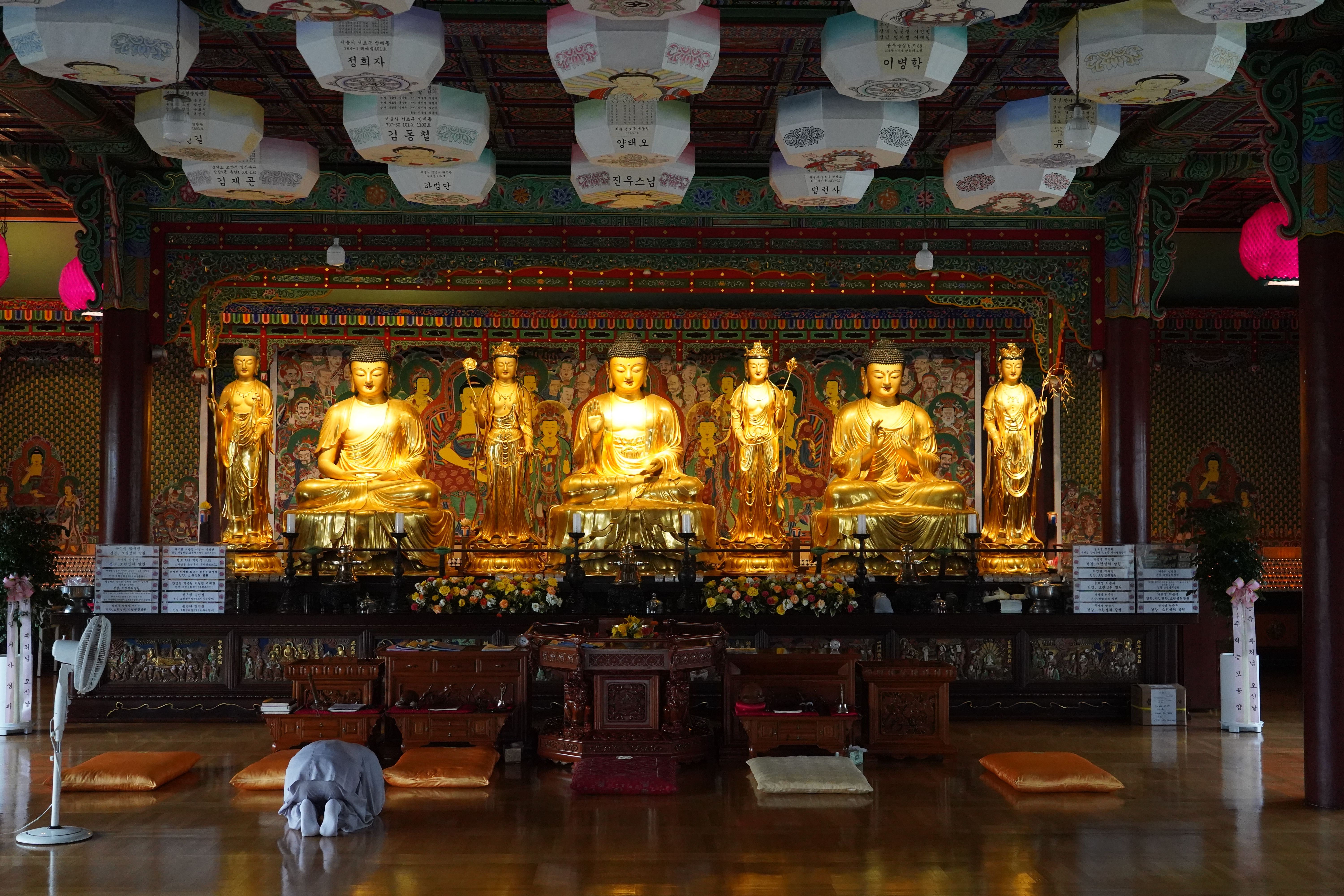 Golden Buddha Statues in Traditional Temple Interior · Free Stock Photo