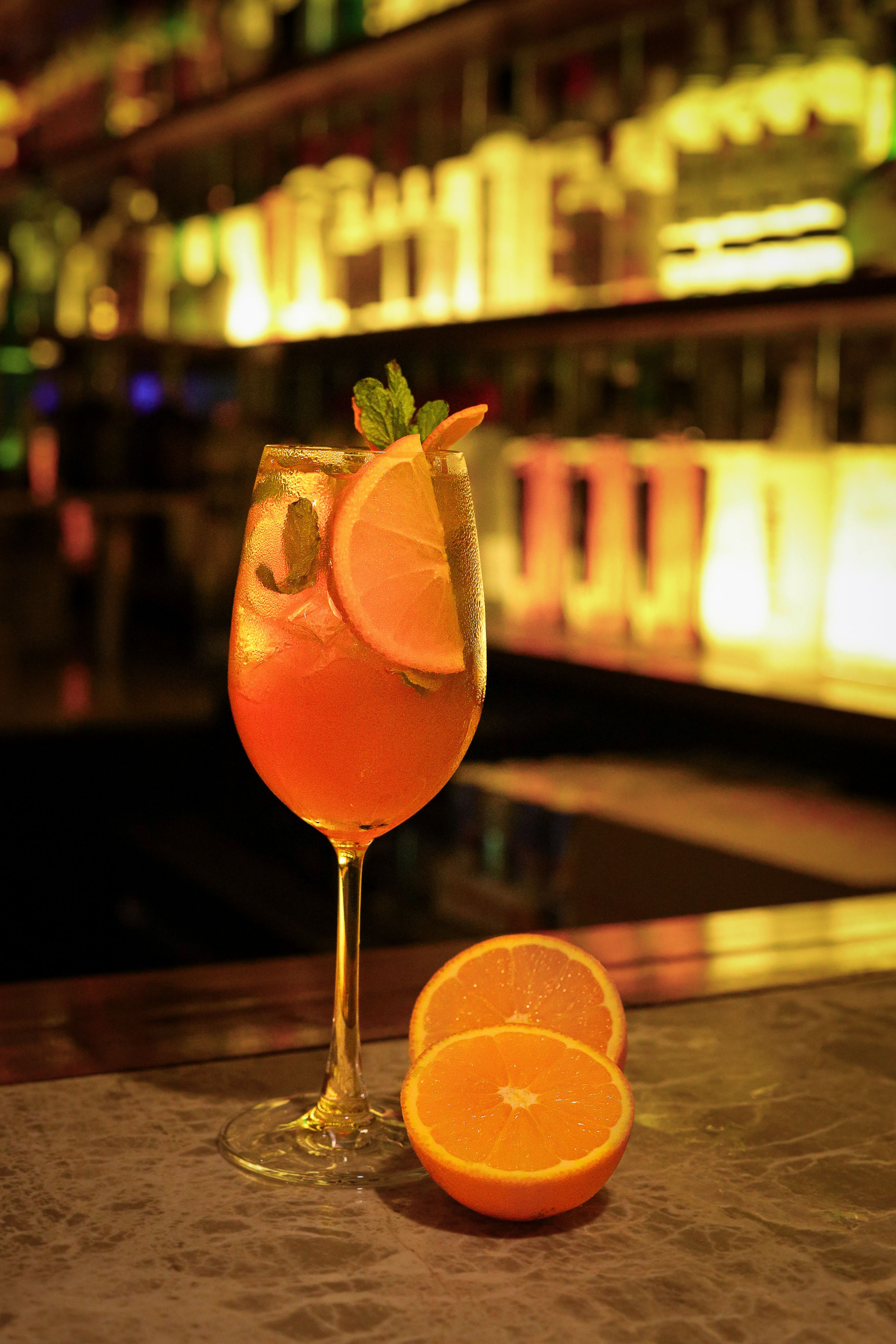 Refreshing Cocktail with Orange Garnish at Bar · Free Stock Photo