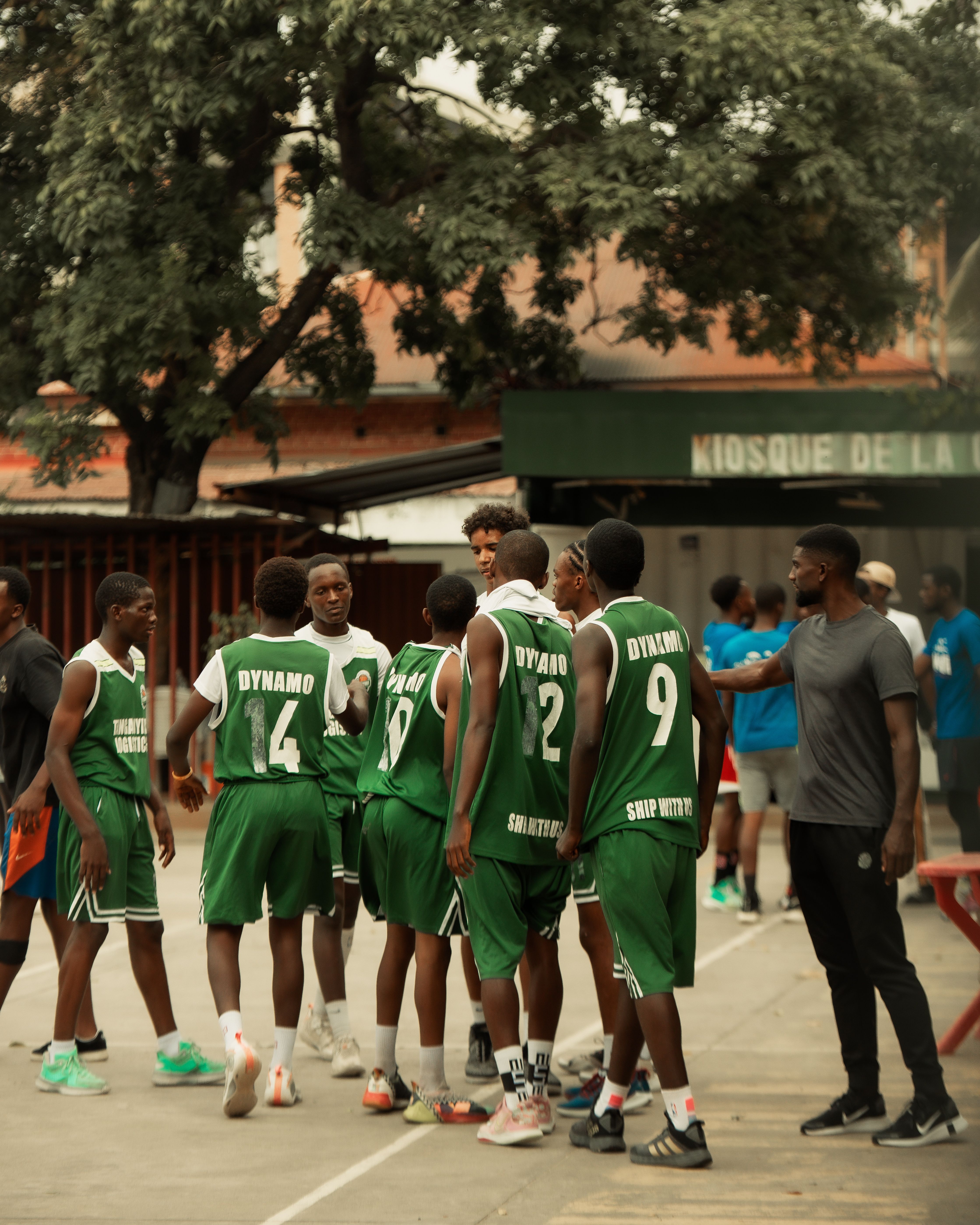 Youth Basketball Team Celebrating Outdoors · Free Stock Photo
