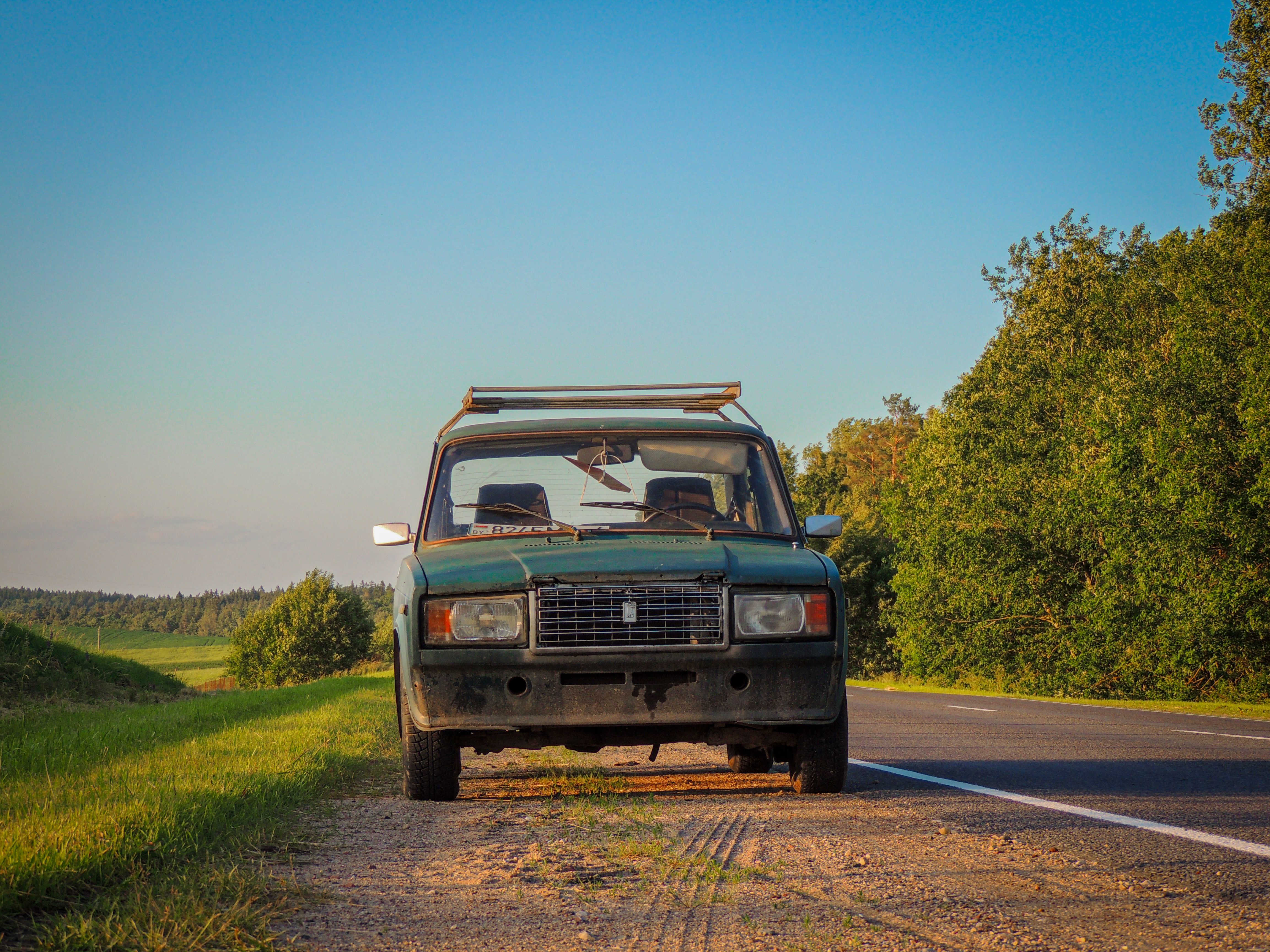Vintage Car on a Rural Country Road · Free Stock Photo