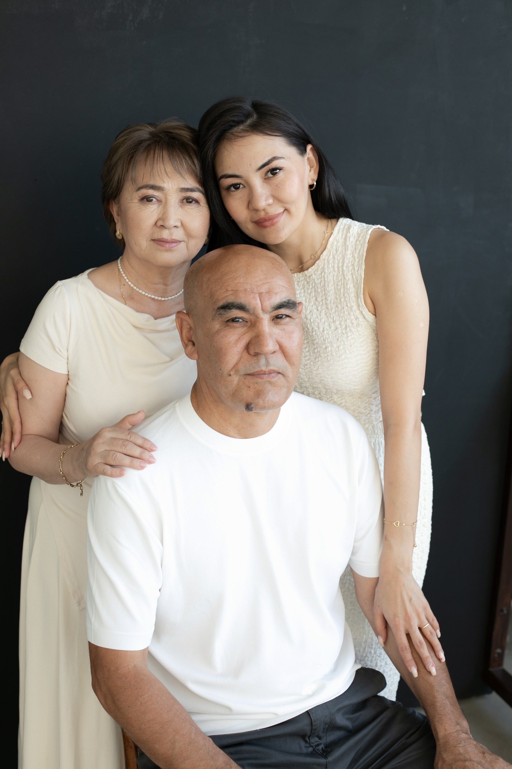 Multi-Generational Family Portrait in Studio Setting · Free Stock Photo