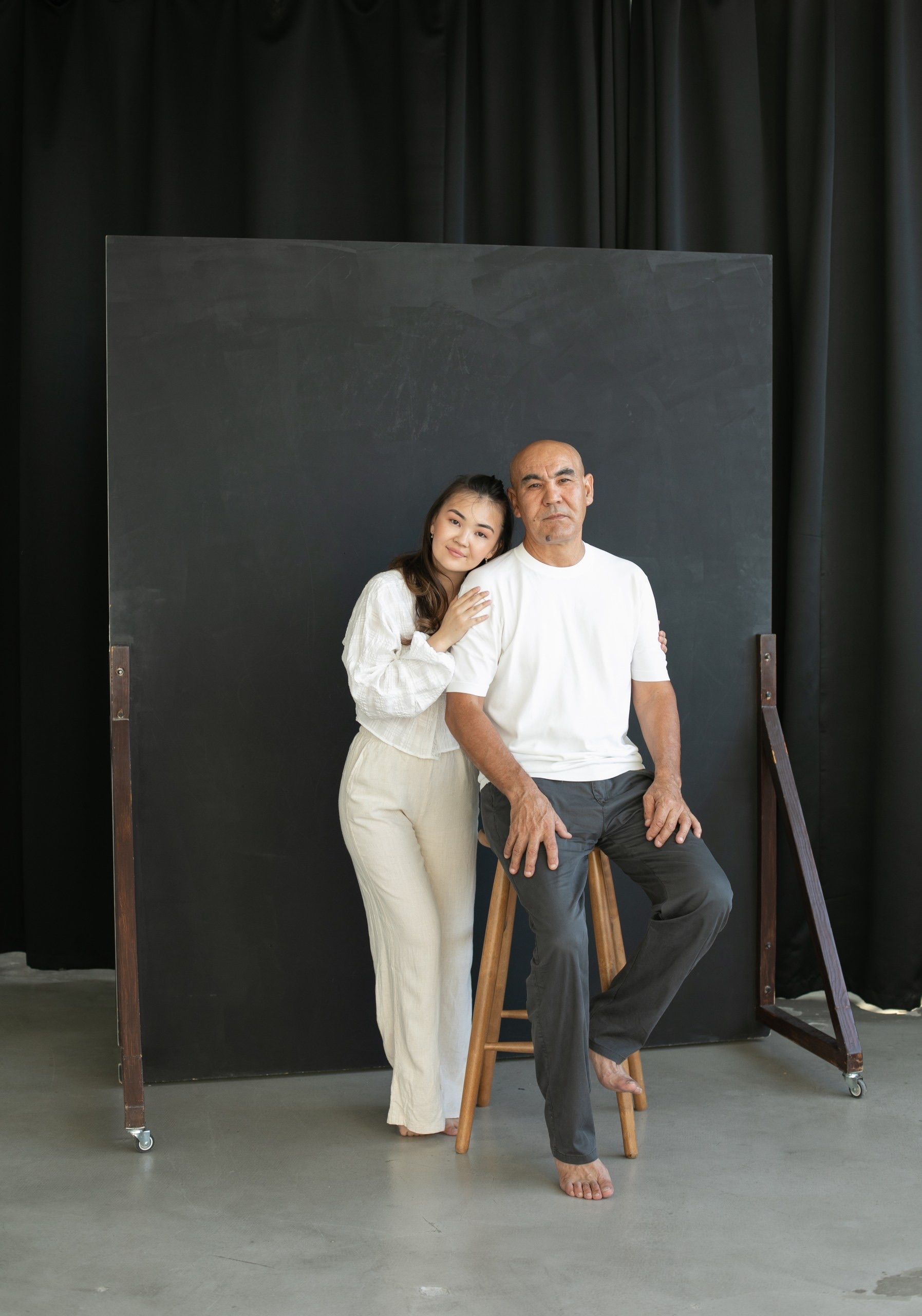 Multi-Generational Family Portrait in Studio Setting · Free Stock Photo